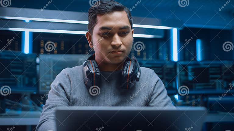 Portrait of Software Developer / Hacker / Programmer Sitting at His ...