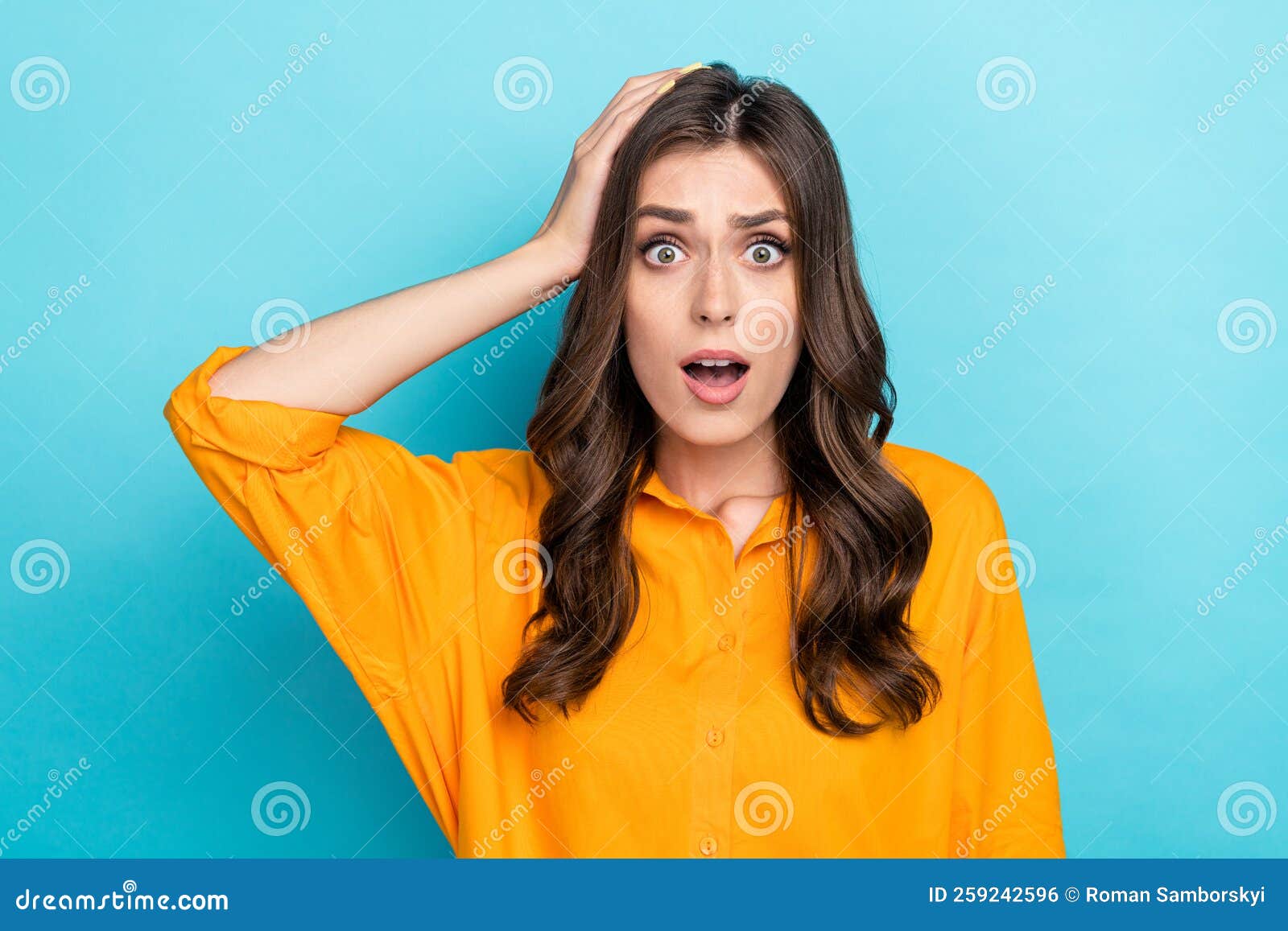Portrait Of Speechless Shocked Girl Arm Touch Head Open Mouth Stare On