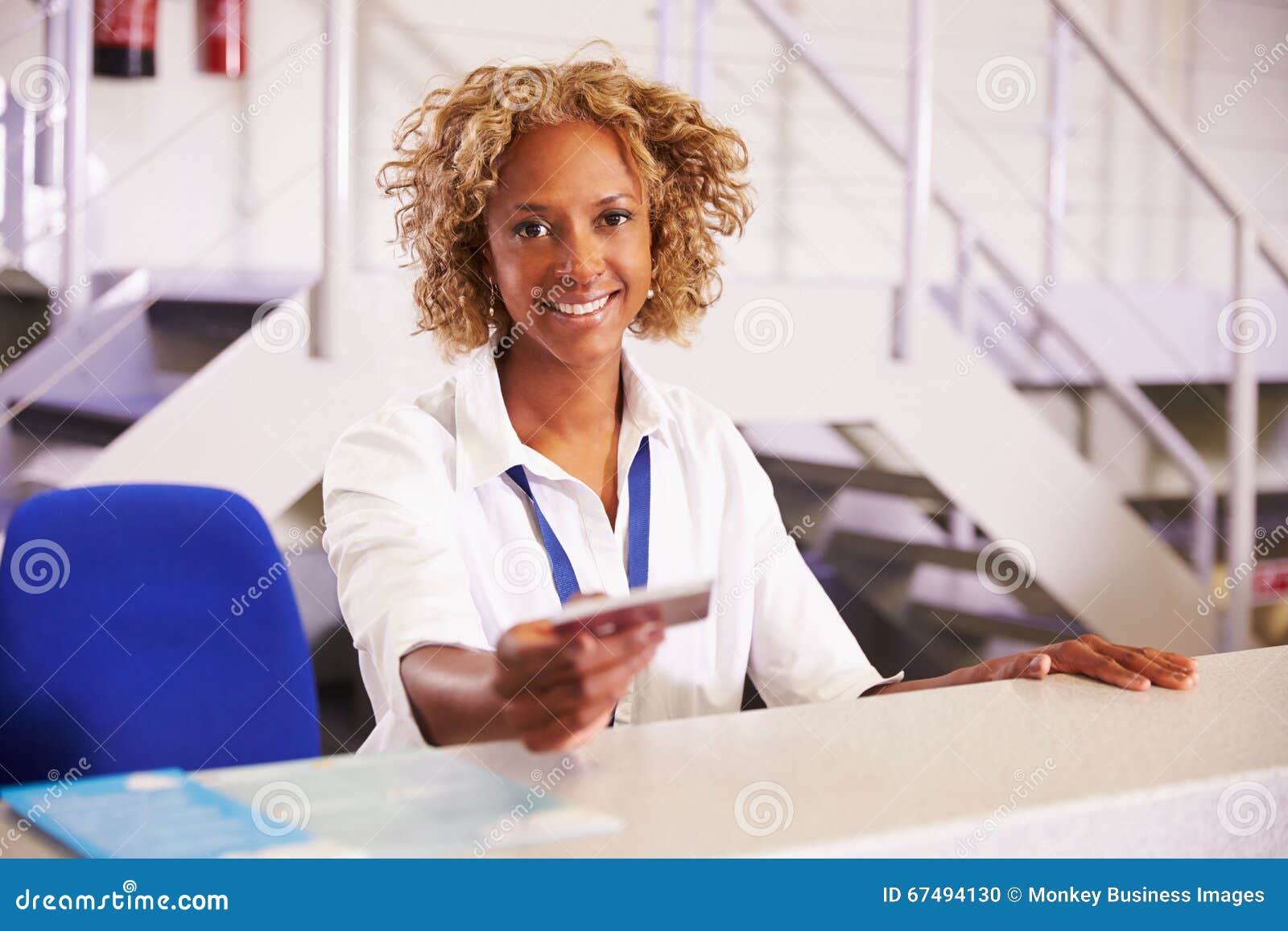 Portrait of Staff at Airport Check in Desk Stock Photo - Image of ...