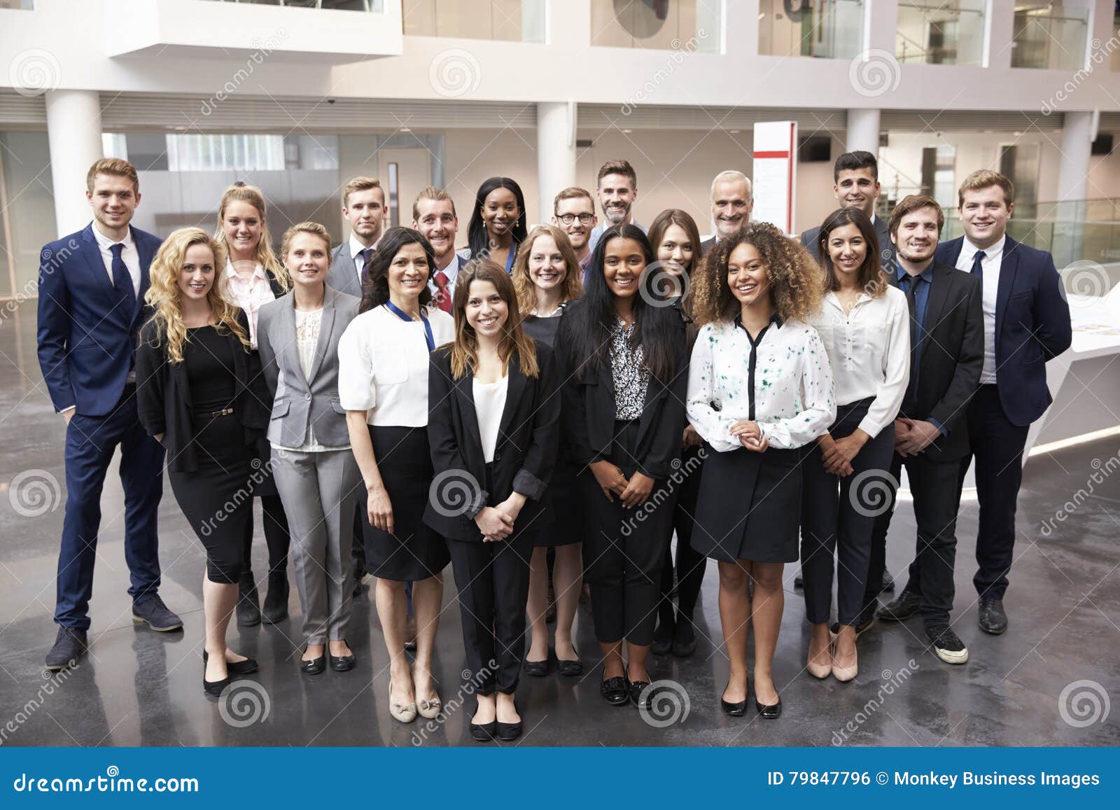 Portrait of Staff Standing in Lobby of Modern Office Stock Photo ...