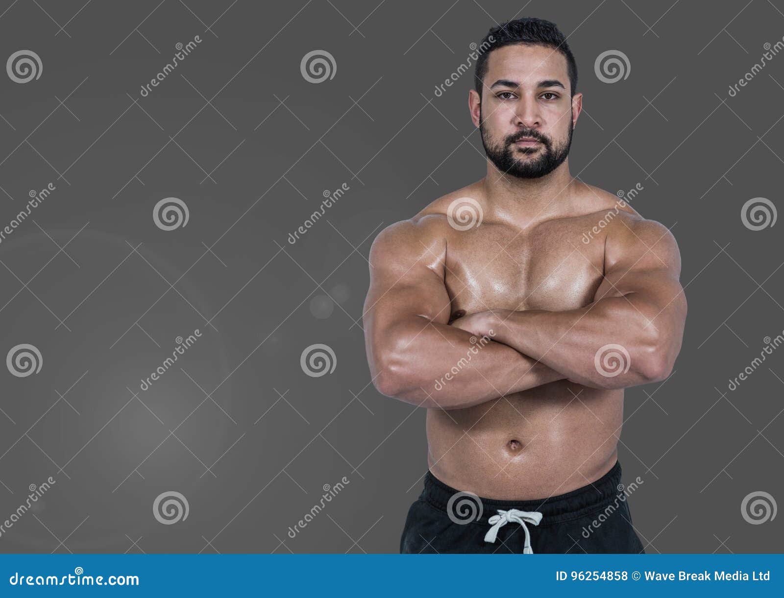 Portrait of Strong Muscular Man with Grey Background Stock Photo ...
