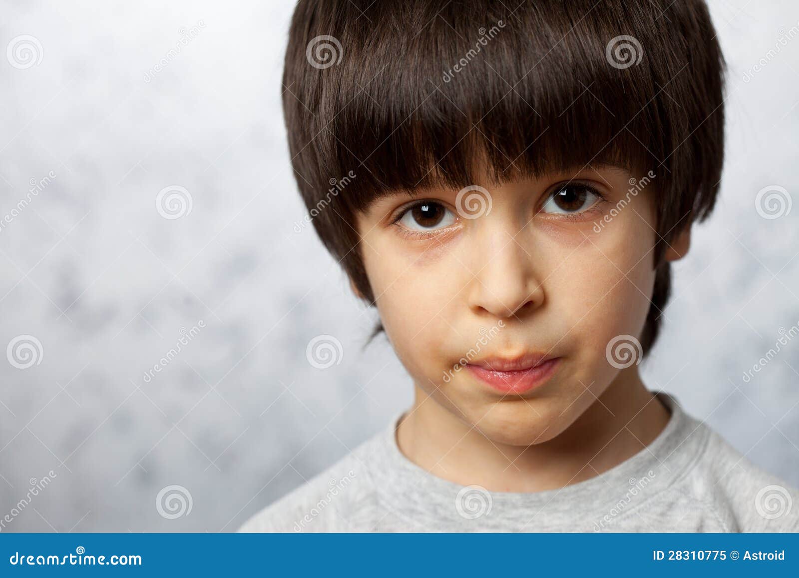 Portrait of a stubborn boy stock image. Image of studio - 28310775