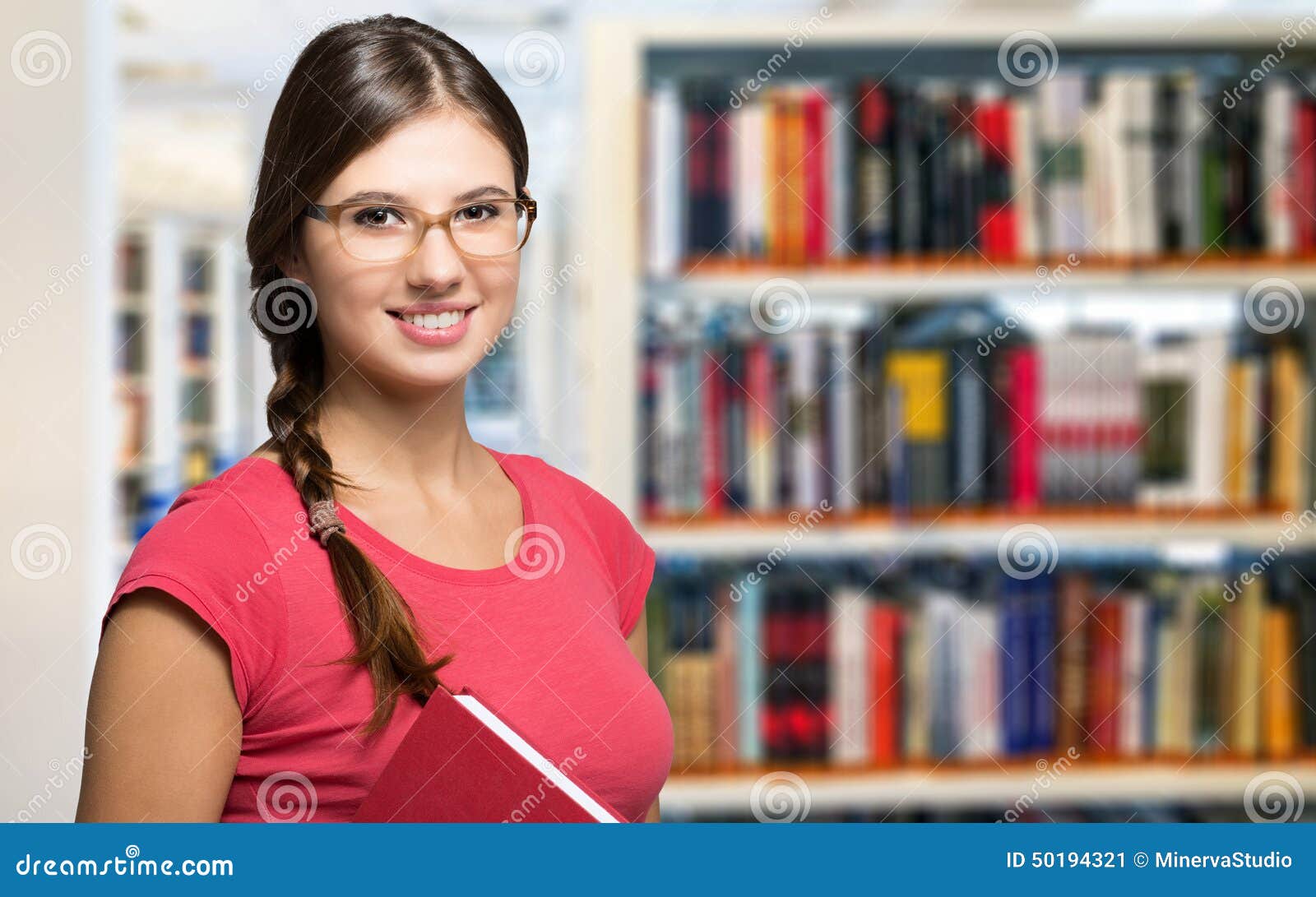 Portrait of a Student in a Library Stock Image - Image of eyeglasses ...