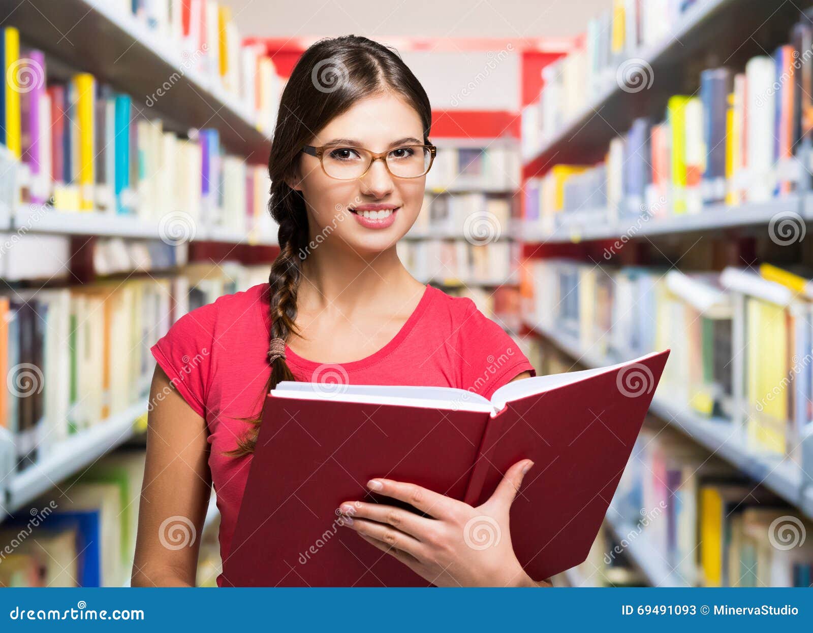 Portrait of a Student in a Library Stock Image - Image of studying ...