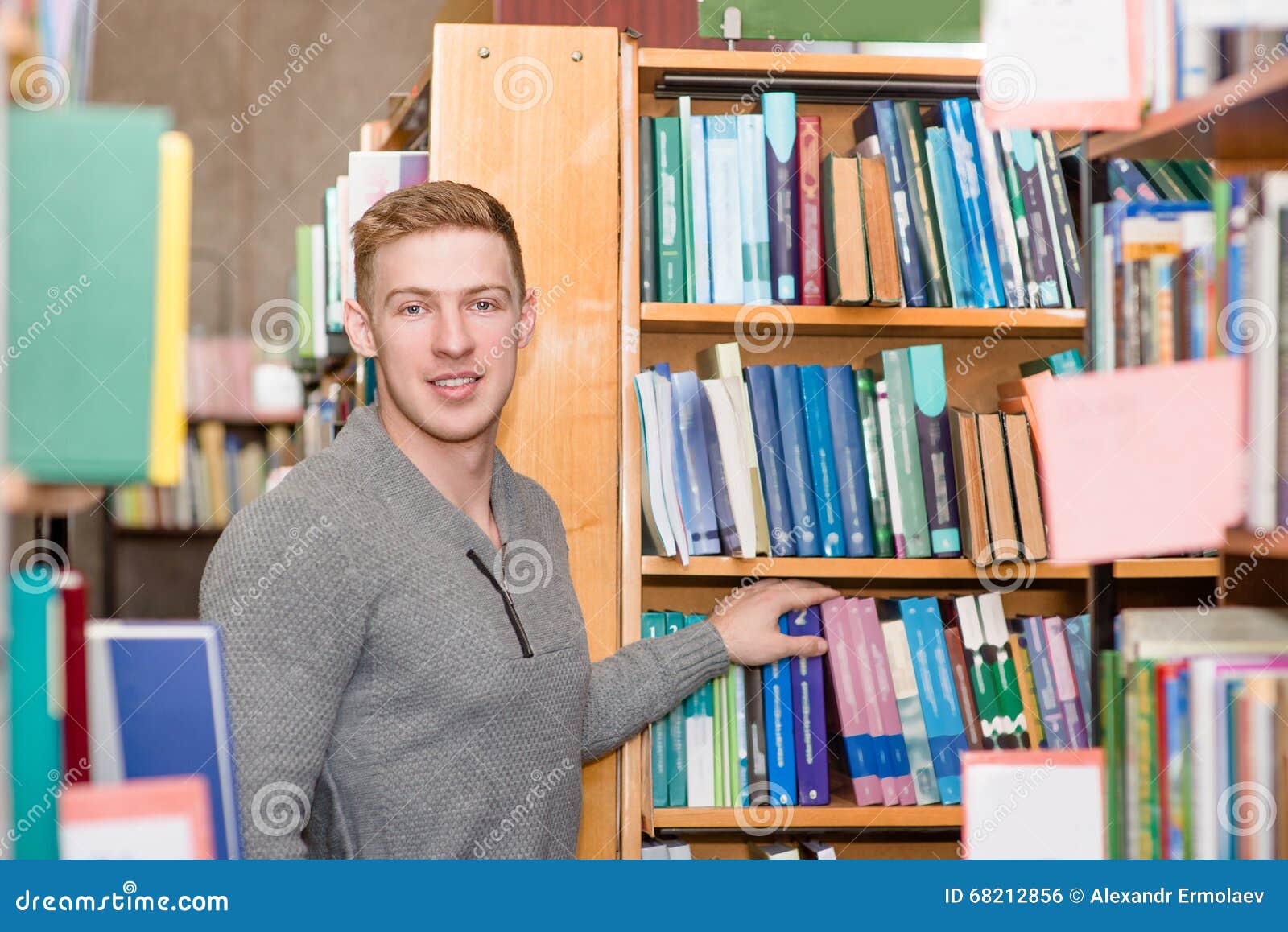 Portrait of a Student Looking at Camera in College Library Stock Photo ...