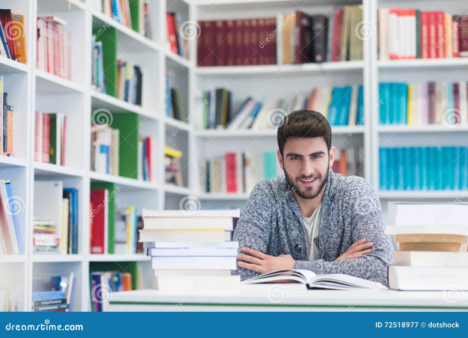 Portrait of Student while Reading Book in School Library Stock Image ...