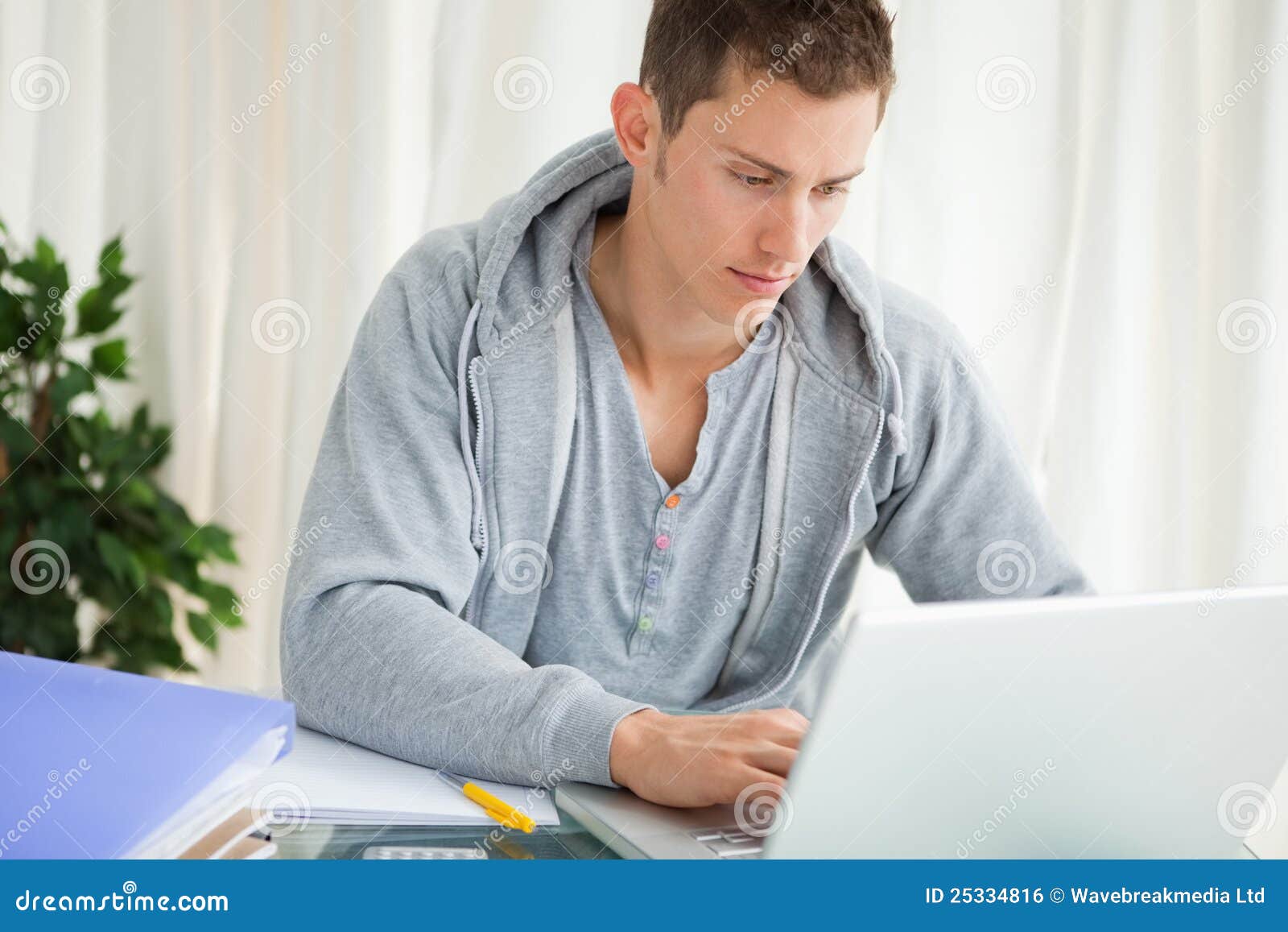 Portrait of a Student Using a Laptop Stock Photo - Image of material ...