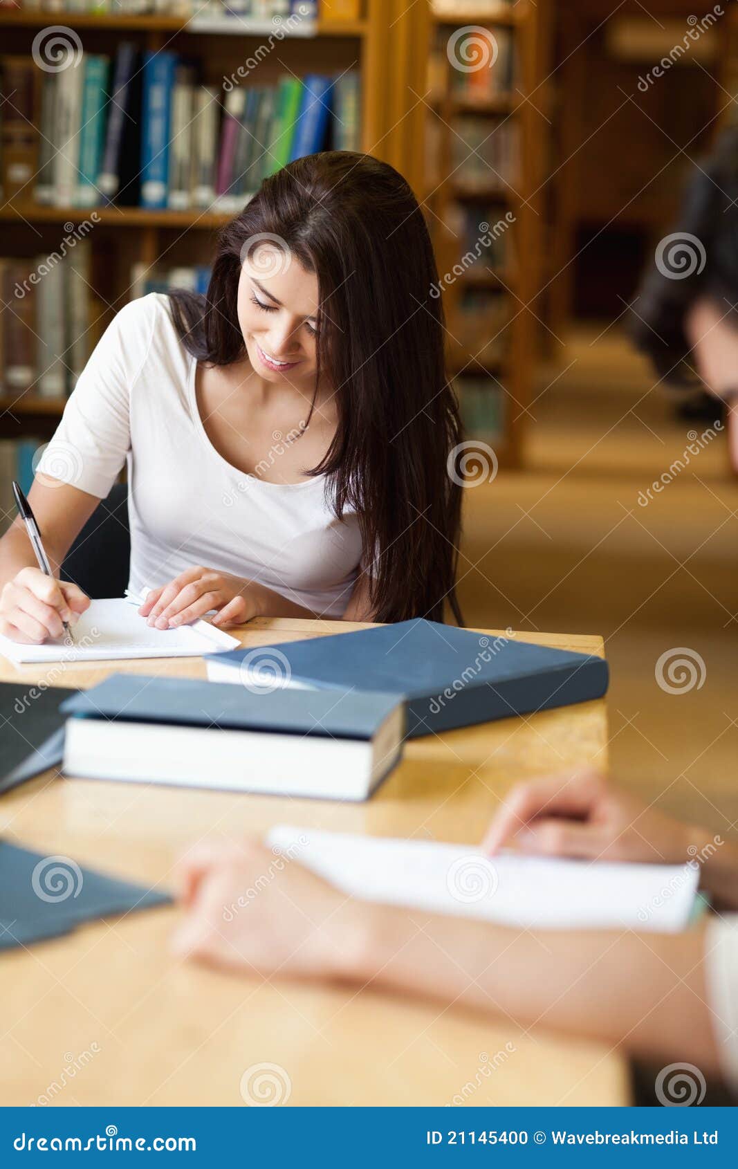 Portrait of a Student Writing a Paper Stock Photo - Image of indoors ...