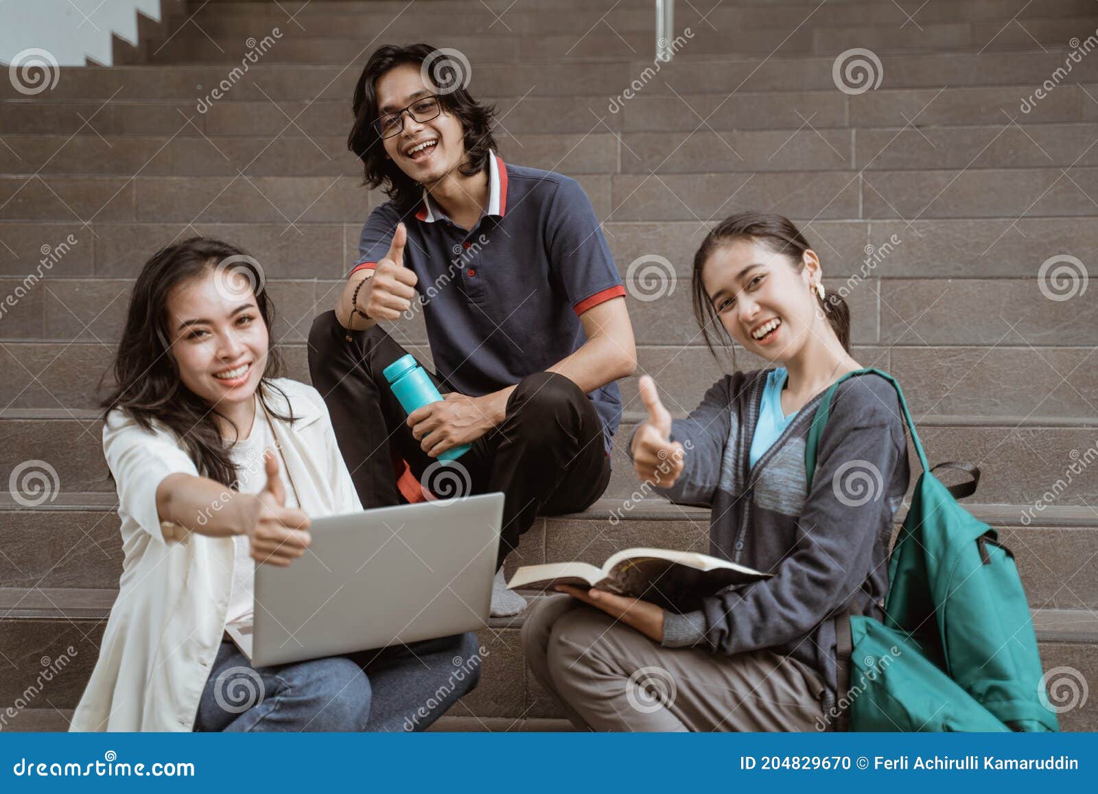 Portrait Students Sit Down Working in Groups on the Floor Stairs Campus ...