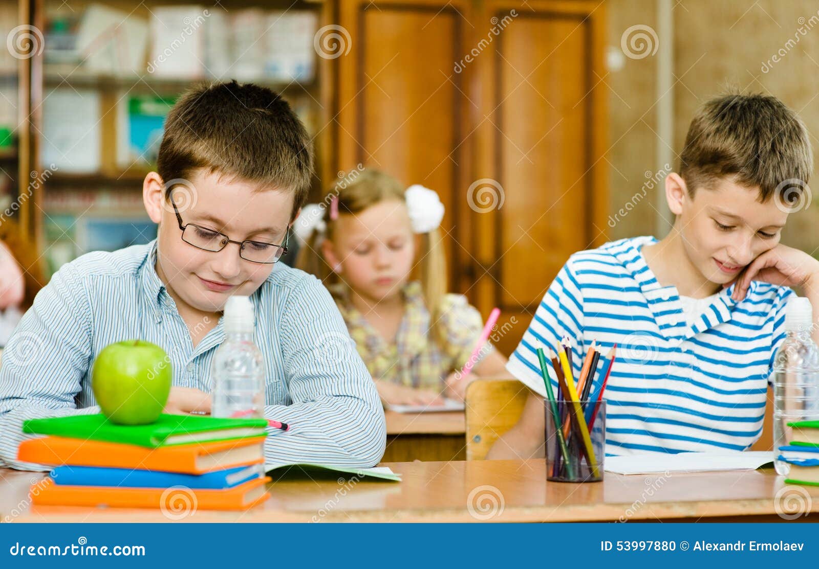 Portrait of Students Writing the Exam in Class Stock Photo - Image of ...