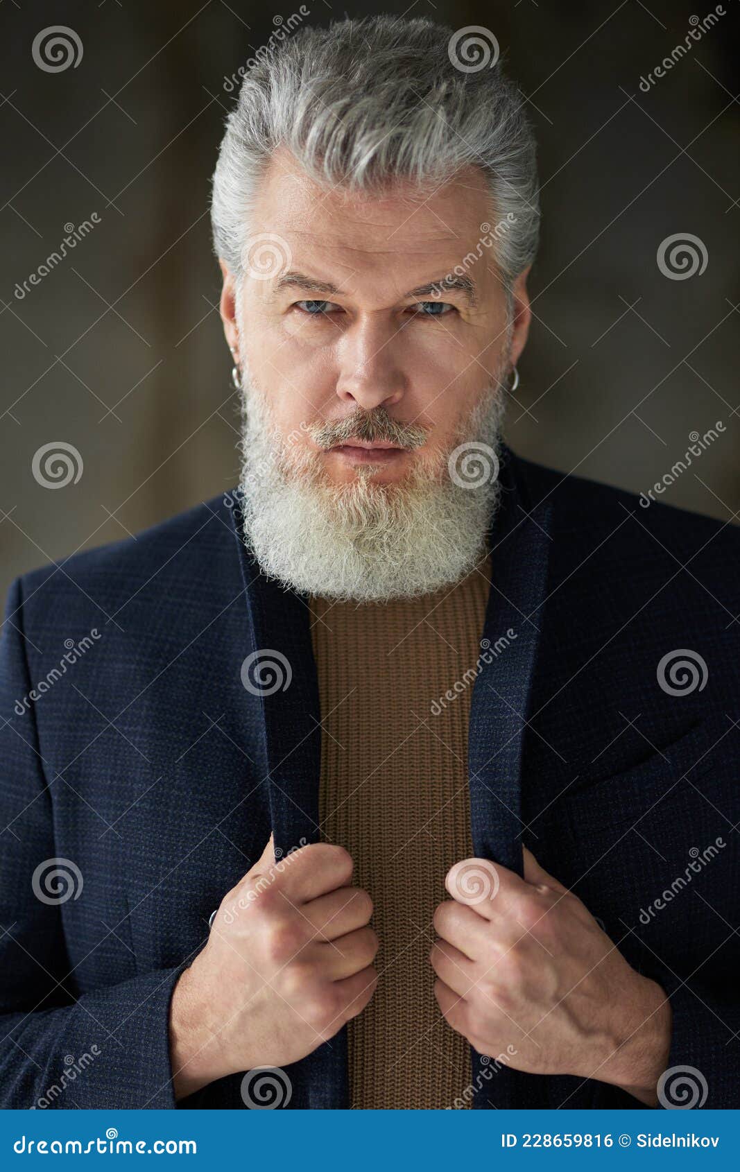 Portrait Of Stylish Serious Handsome Middle Aged Man Wearing Suit