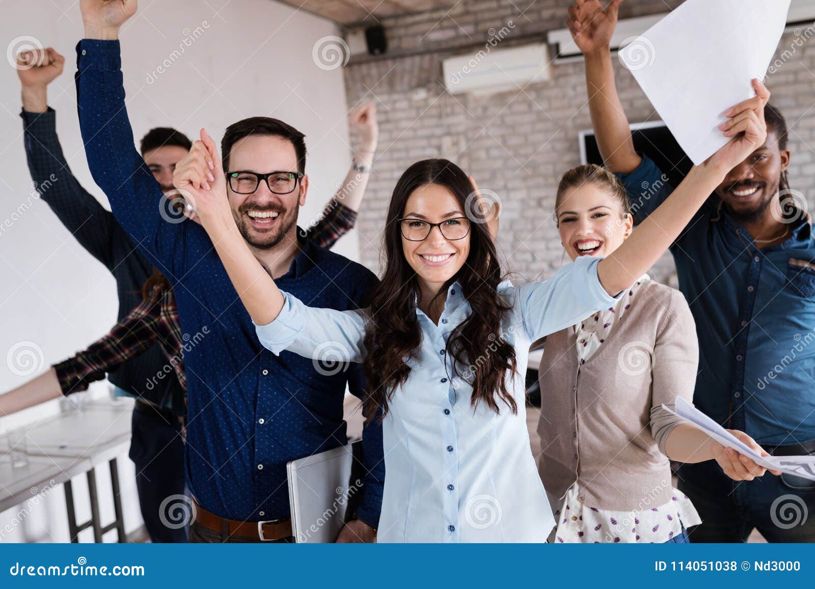 Portrait of Successful Business Team Posing in Office Stock Photo ...
