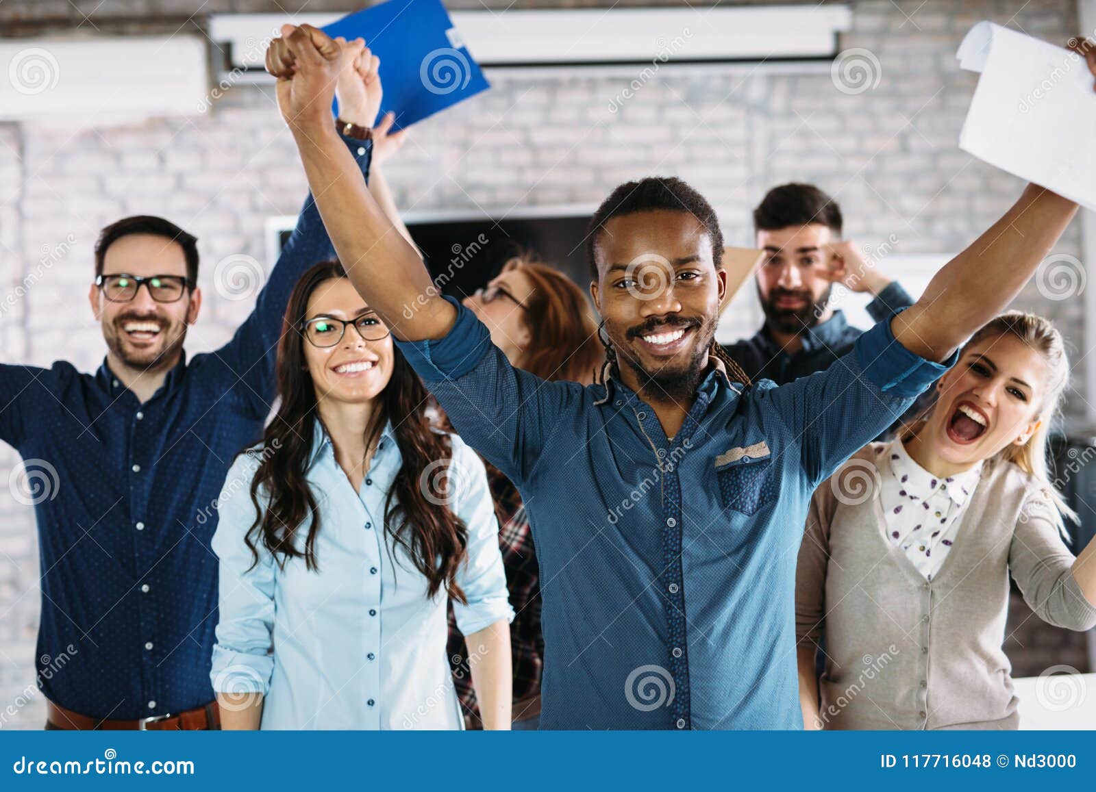 Portrait of Successful Business Team Posing in Office Stock Photo ...