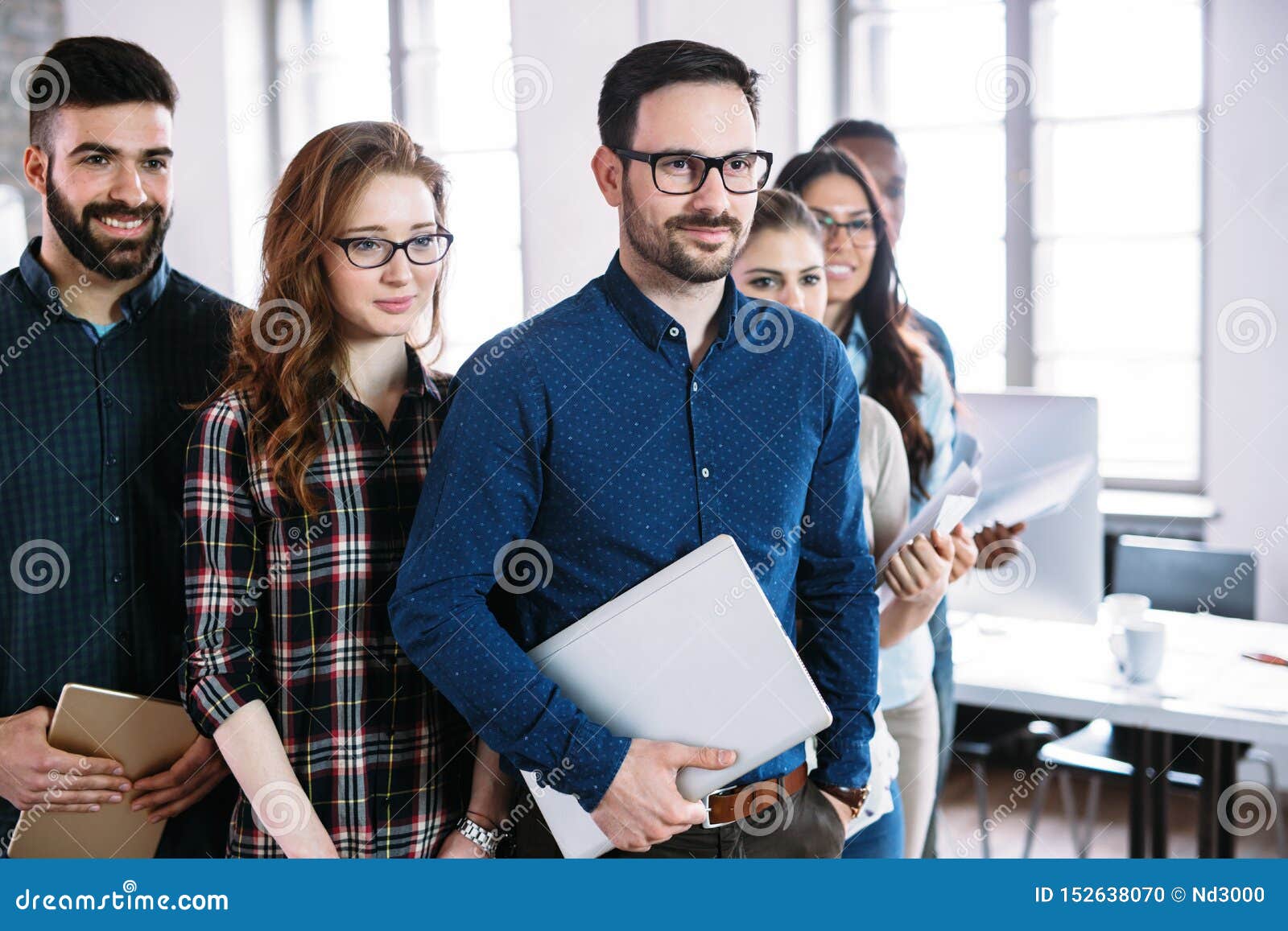 Portrait of Successful Business Team Posing in Office Stock Photo ...