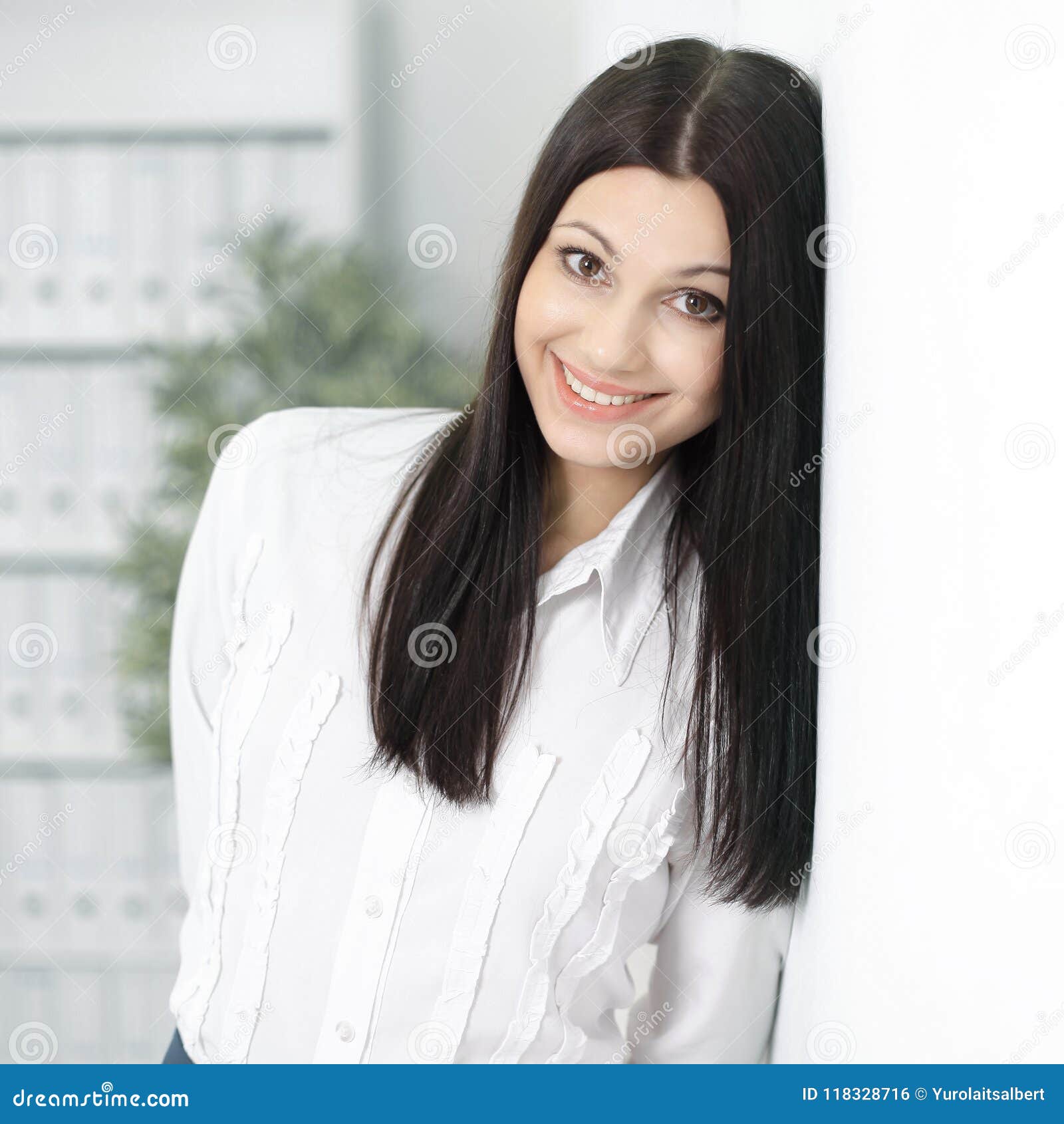 Successful Female Assistant in the Background of the Office Stock Photo ...