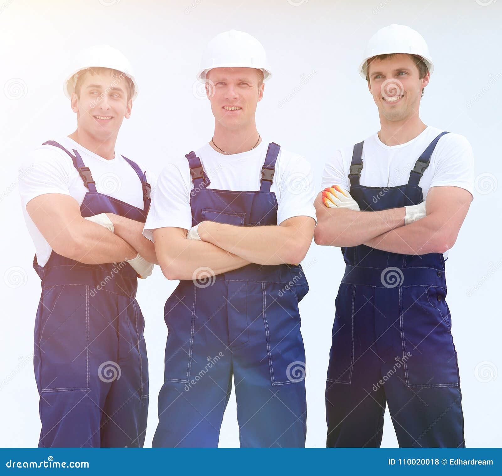 Successful Construction Workers Standing with Arms Crossed Stock Photo ...