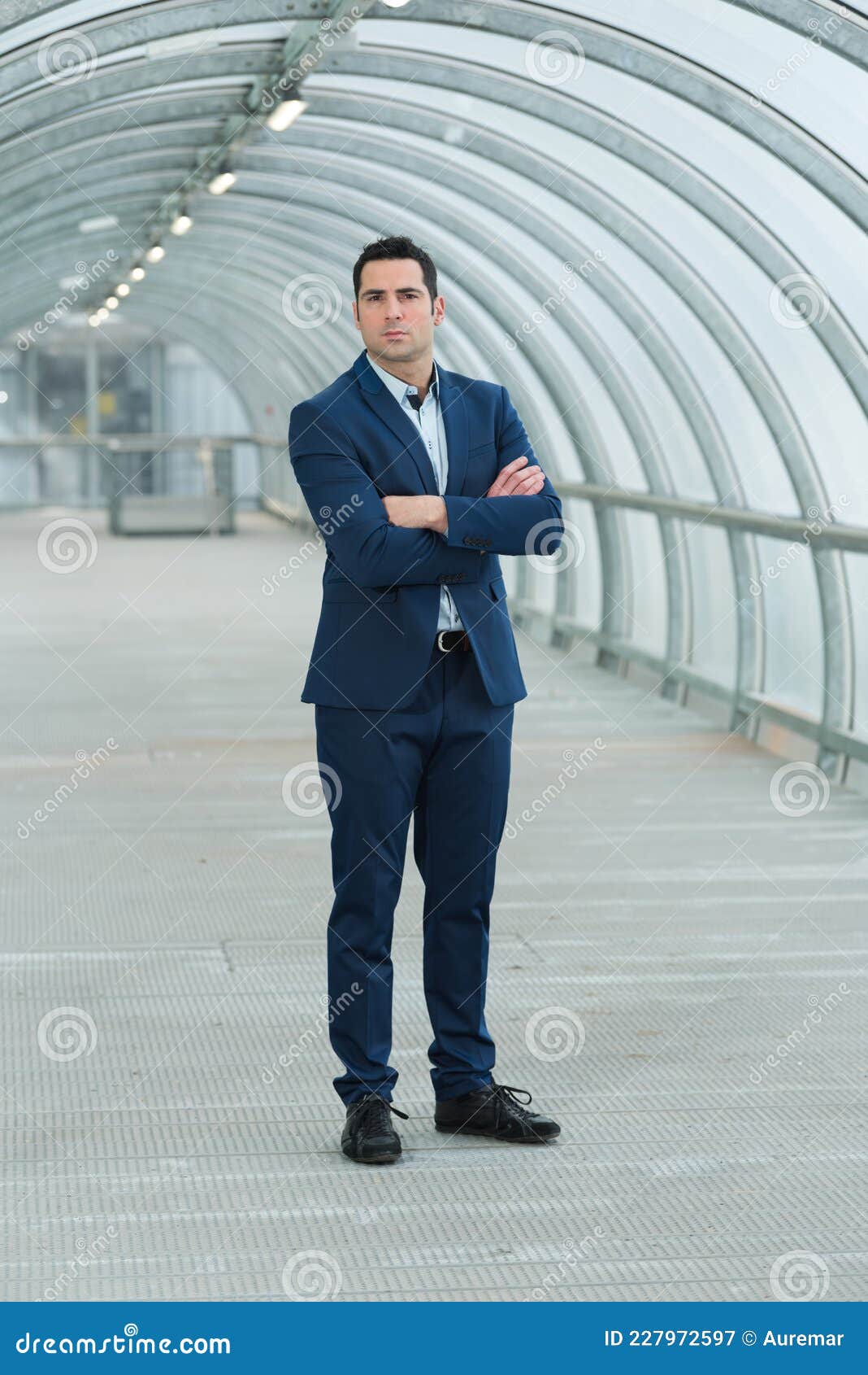 Portrait Suited Man in Arched Walkway Stock Image - Image of archway ...