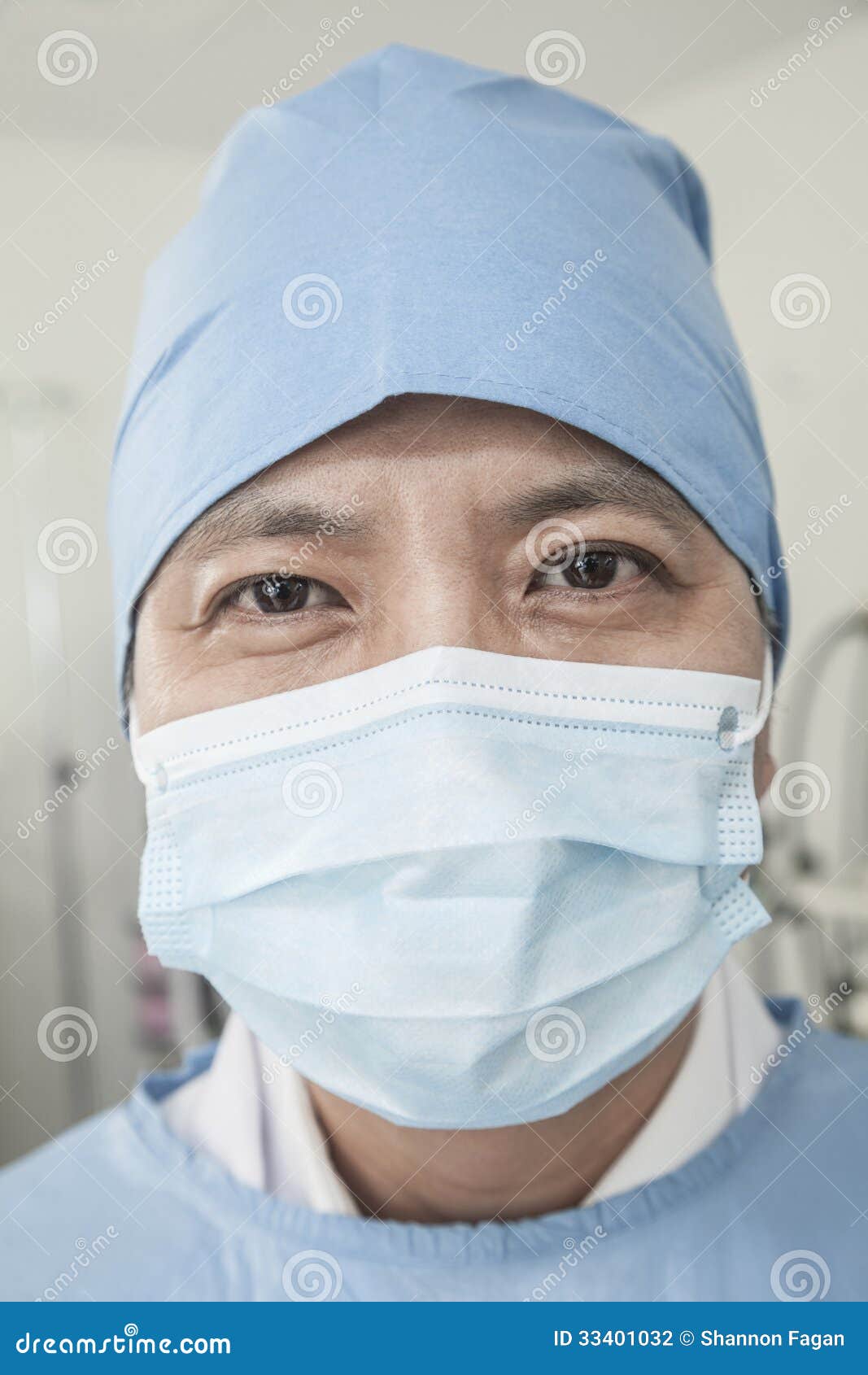 Portrait of Surgeon with Surgical Mask and Surgical Cap in the ...
