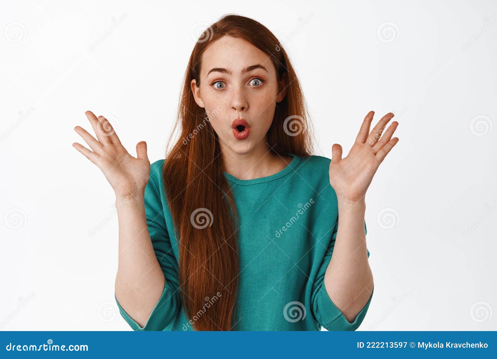 Portrait Of Surprised Caucasian Woman With Red Hair Say Wow And Stare