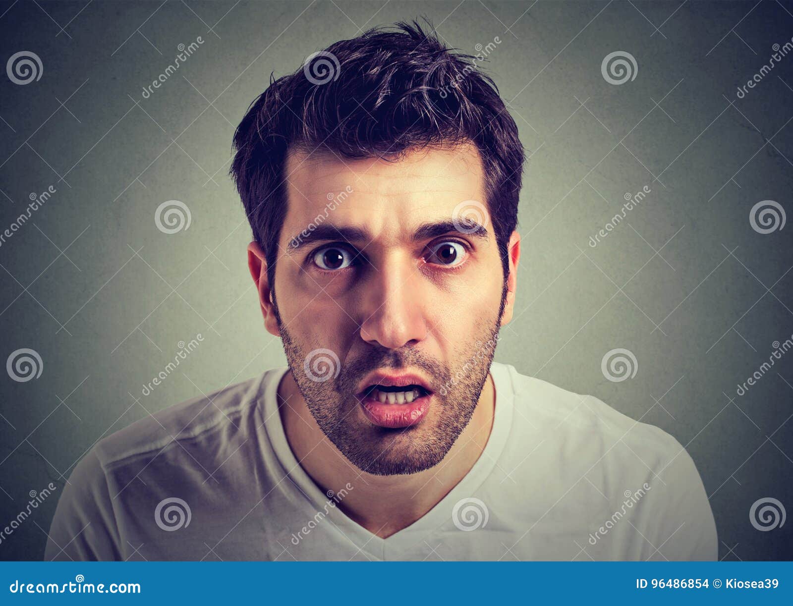 Portrait Of Stunned Girl Seeing Something Disgusting Or Terrible Stock