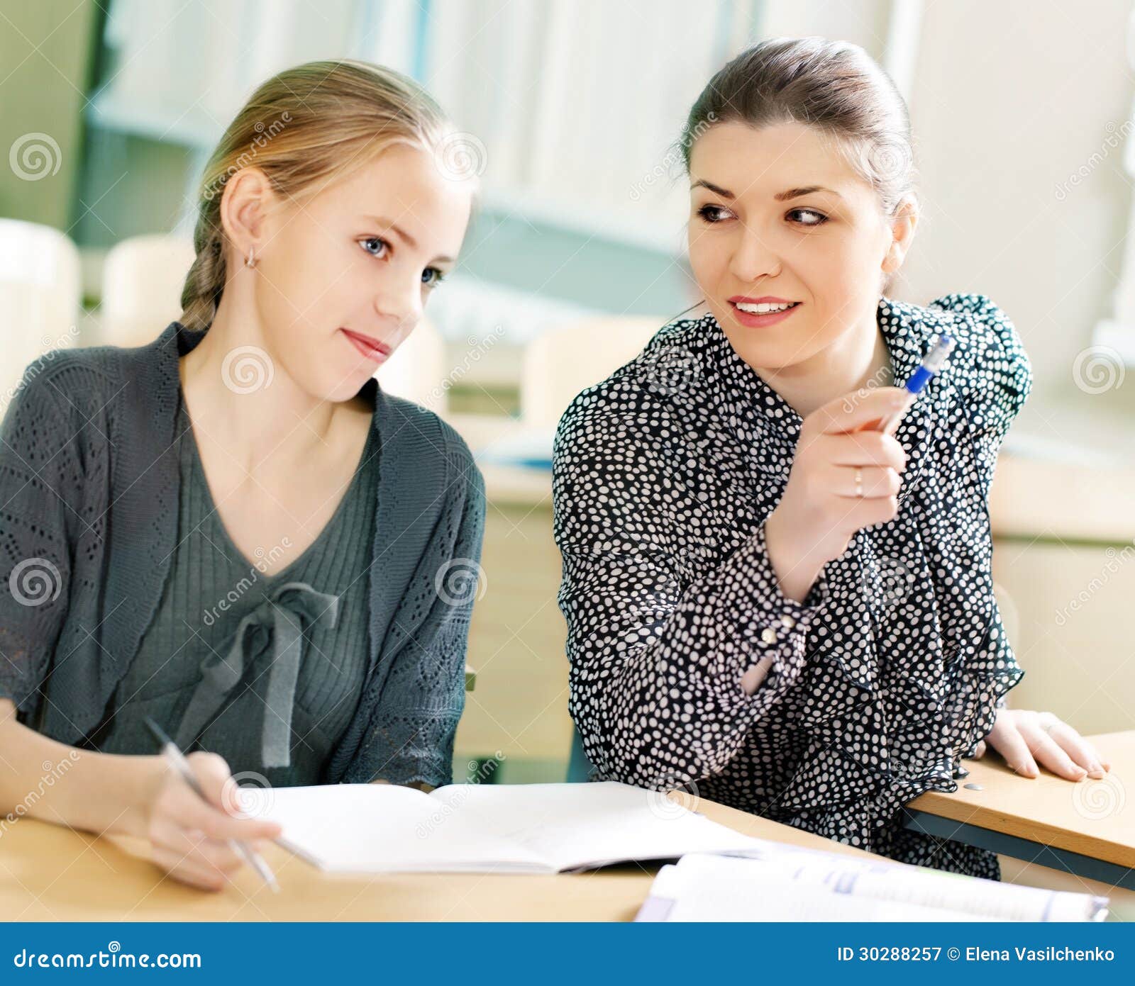 Portrait of a Teacher Explaining Something Stock Image - Image of team ...