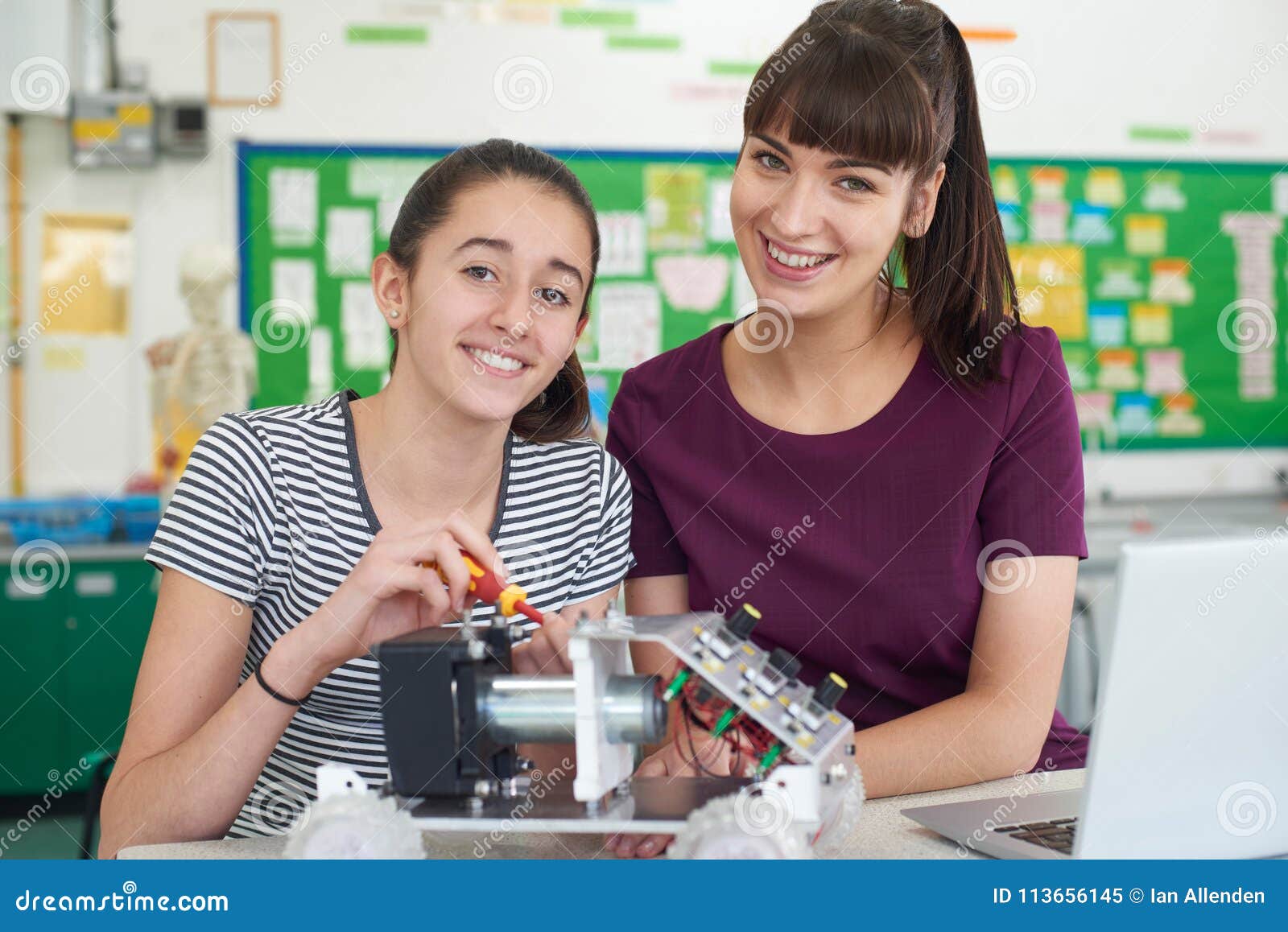 Portrait of Teacher with Female Pupil Studying Robotics in Science ... Portrait of Teacher with Female Pupil Studying Robotics in Science ...