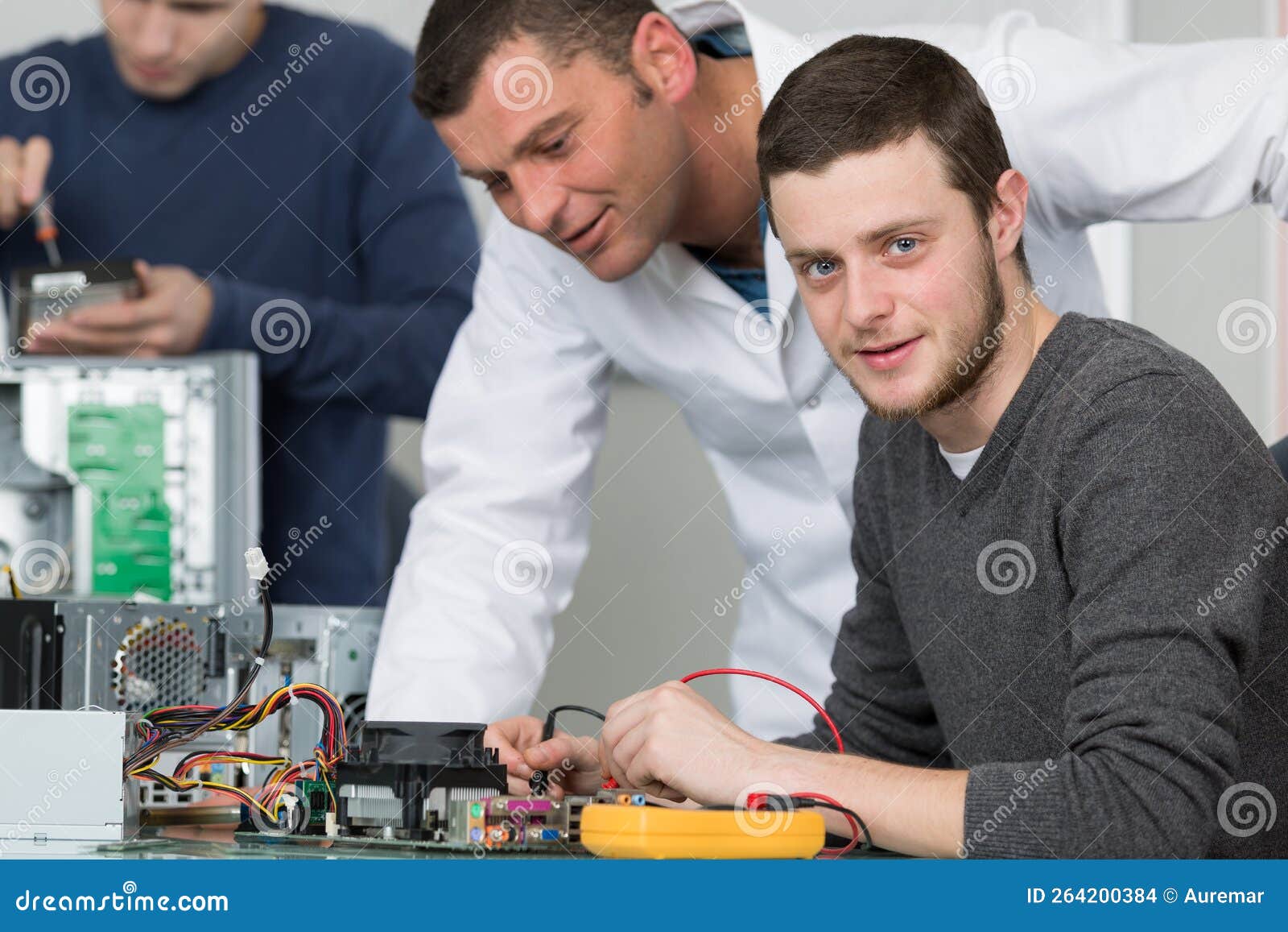 Portrait Teacher Inspecting Assemblers Work Stock Photo - Image of ...