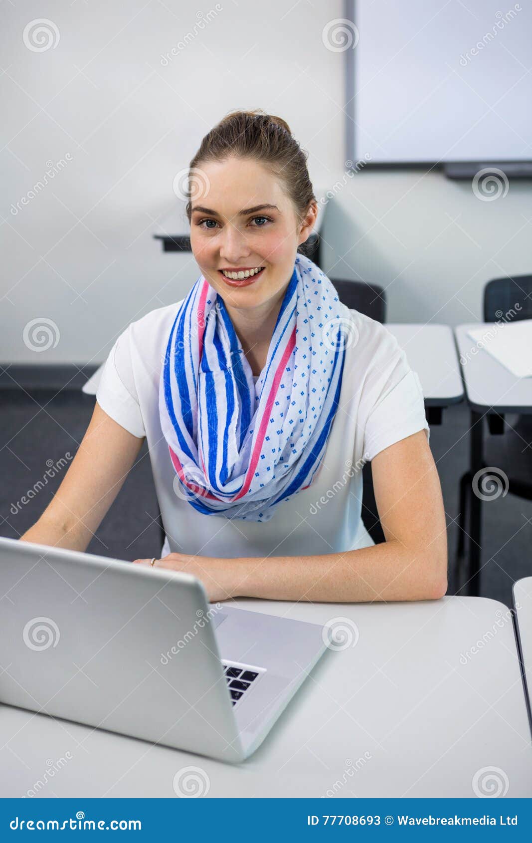 Portrait of Teacher Using Laptop in Classroom Stock Image - Image of ...