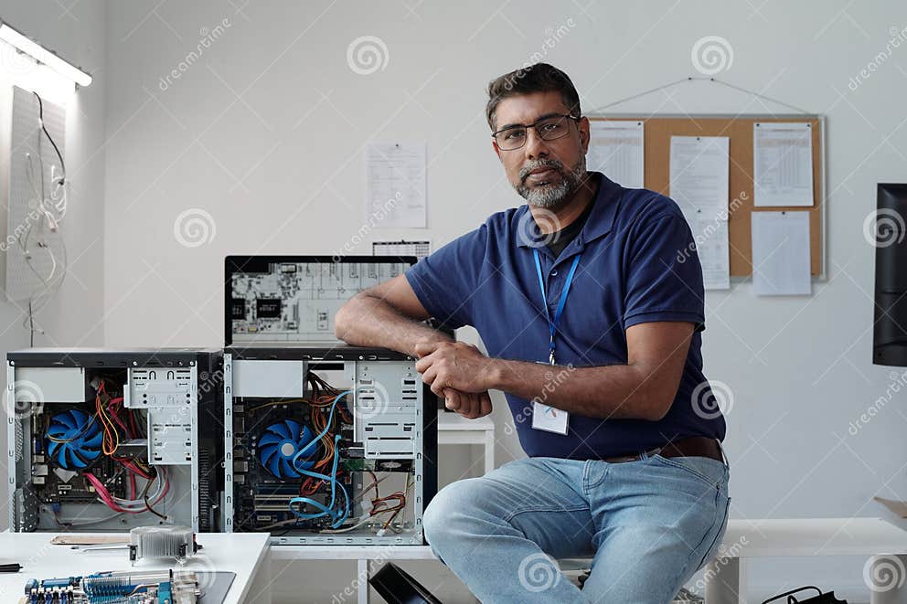 Portrait of Technician Demonstrating Computer Repairs Stock Image ...