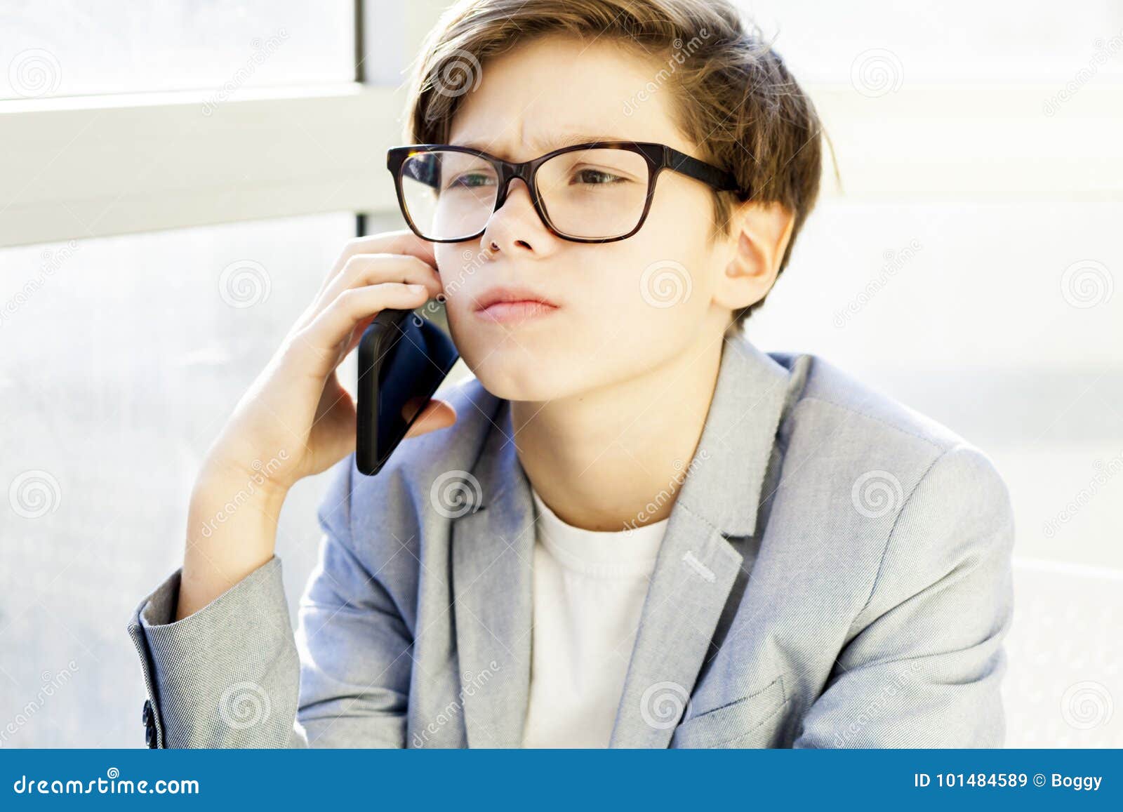 Teen Boy Using Mobile Phone Stock Image - Image of happy, young: 101484589
