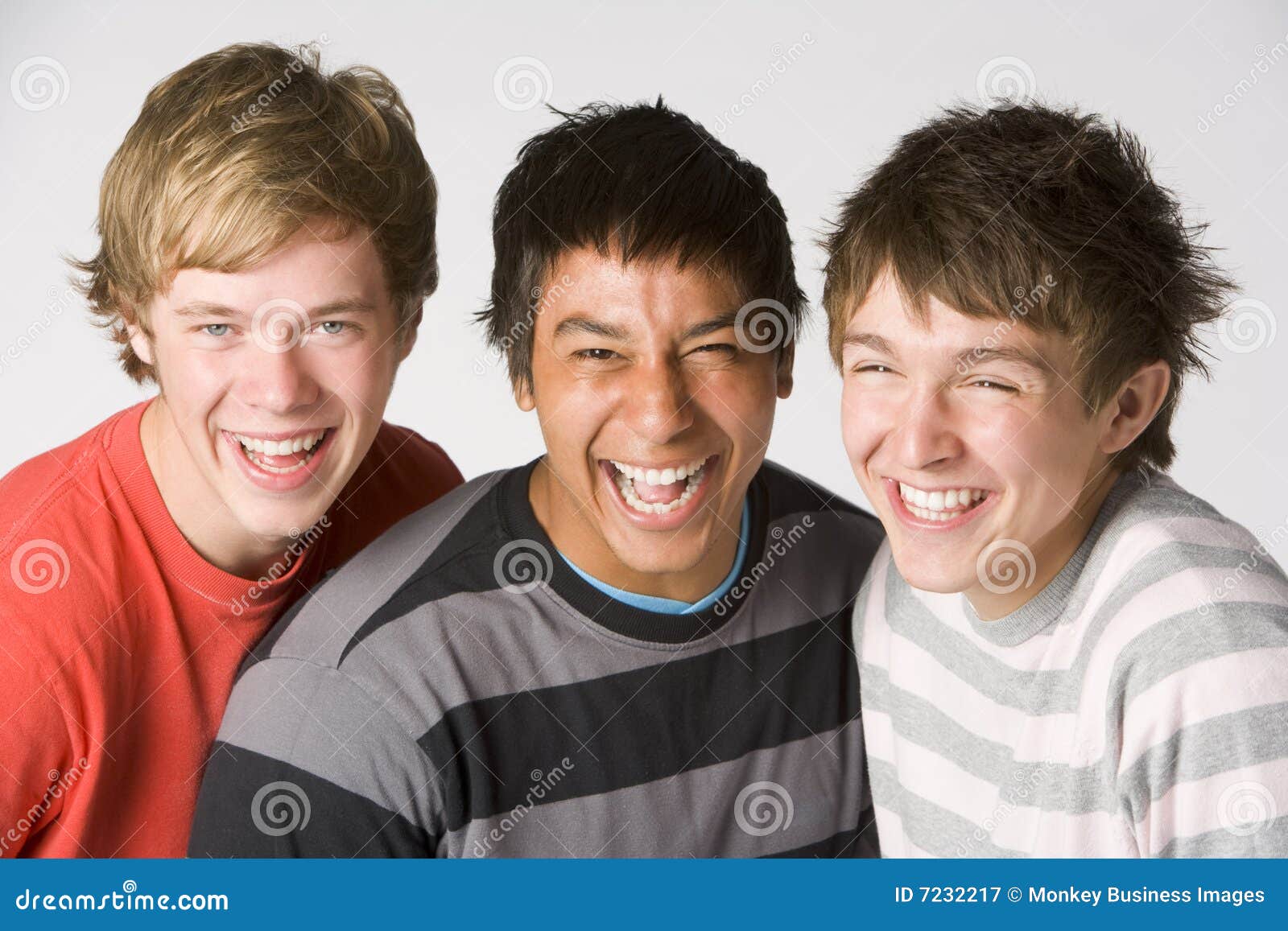 Two Teenage Boys Telling Jokes To Teenage Girl Stock Image ...