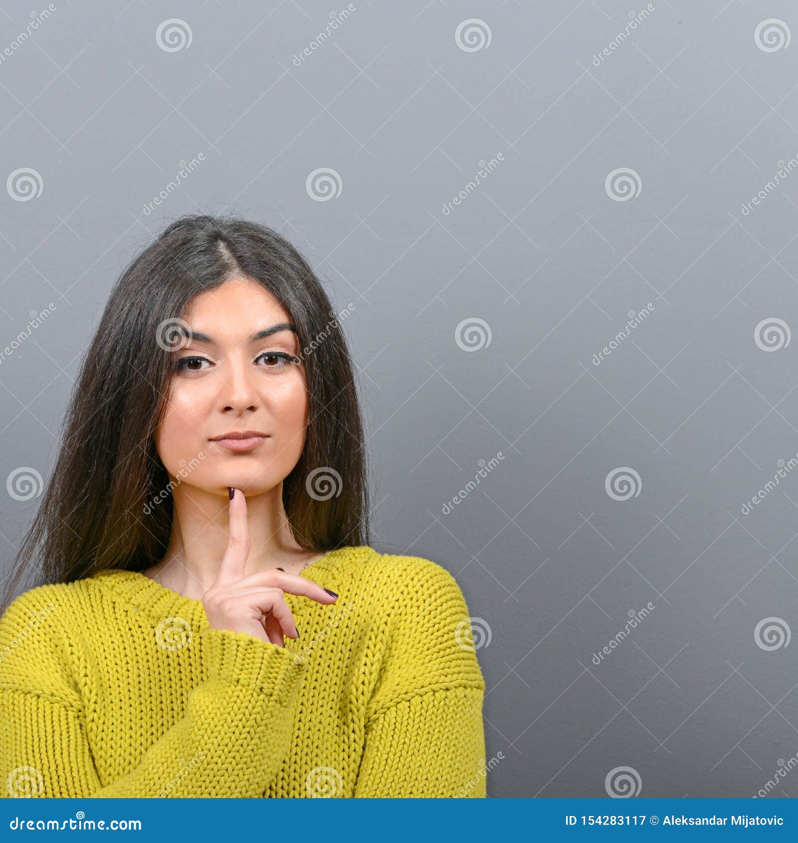 Portrait of Thoughtful Business Woman Against Gray Background Stock ... Portrait of Thoughtful Business Woman Against Gray Background Stock ...