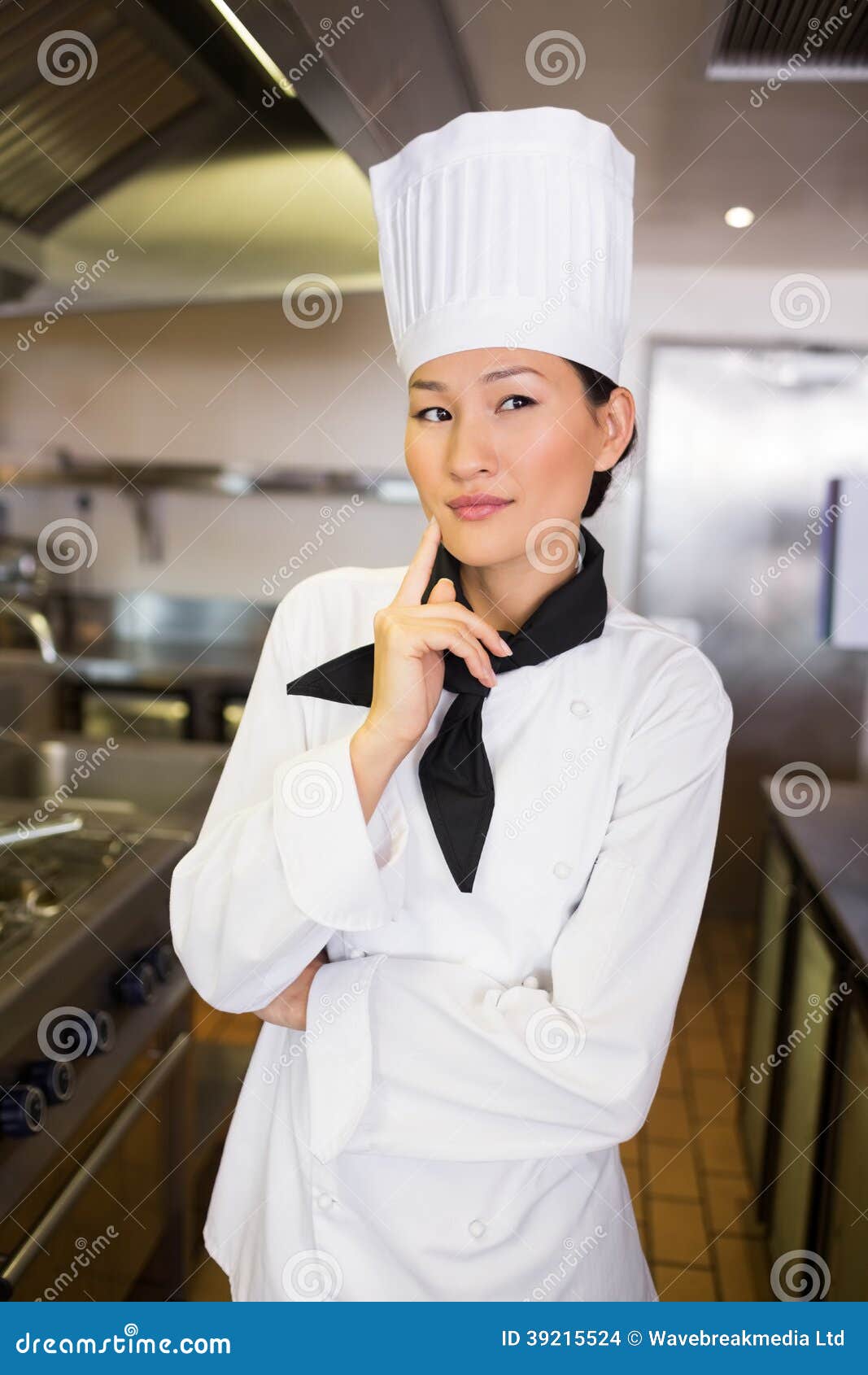 Portrait of Thoughtful Female Cook in Kitchen Stock Photo - Image of ...