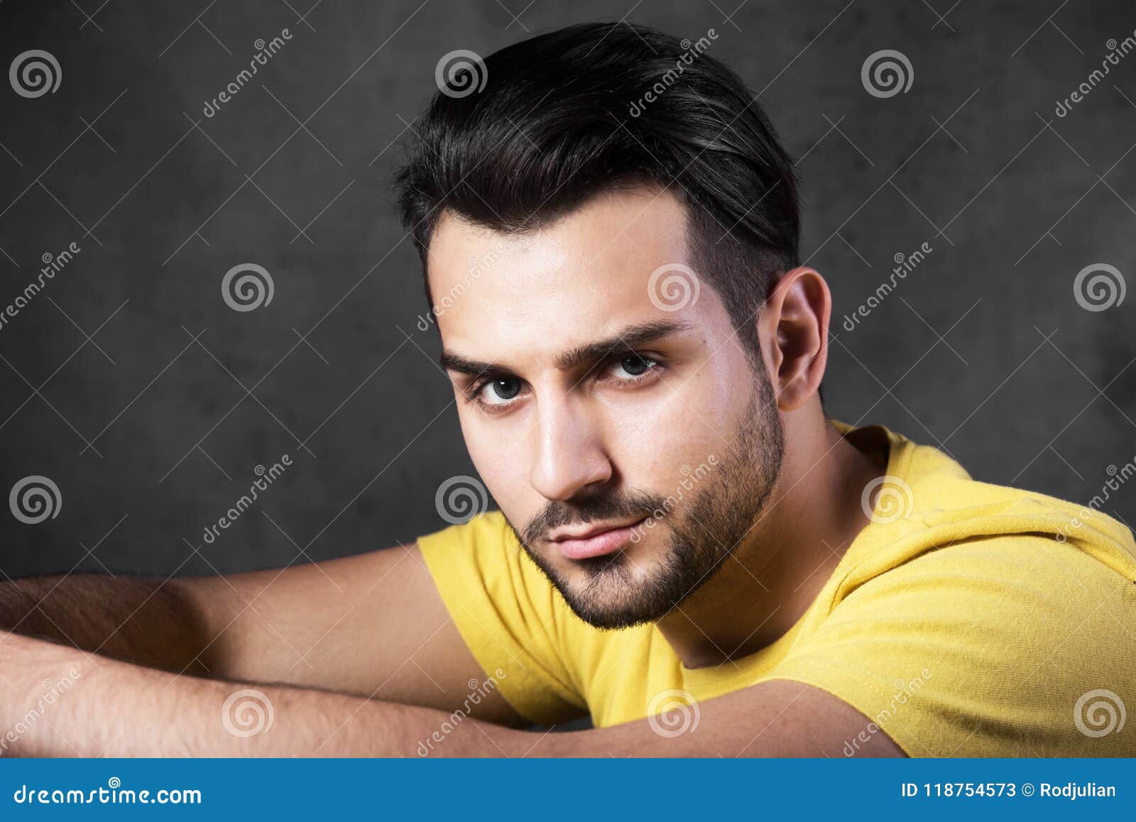 Portrait of Thoughtful Young Man Sitting on the Chair. Stock Image ... Portrait of Thoughtful Young Man Sitting on the Chair. Stock Image ...