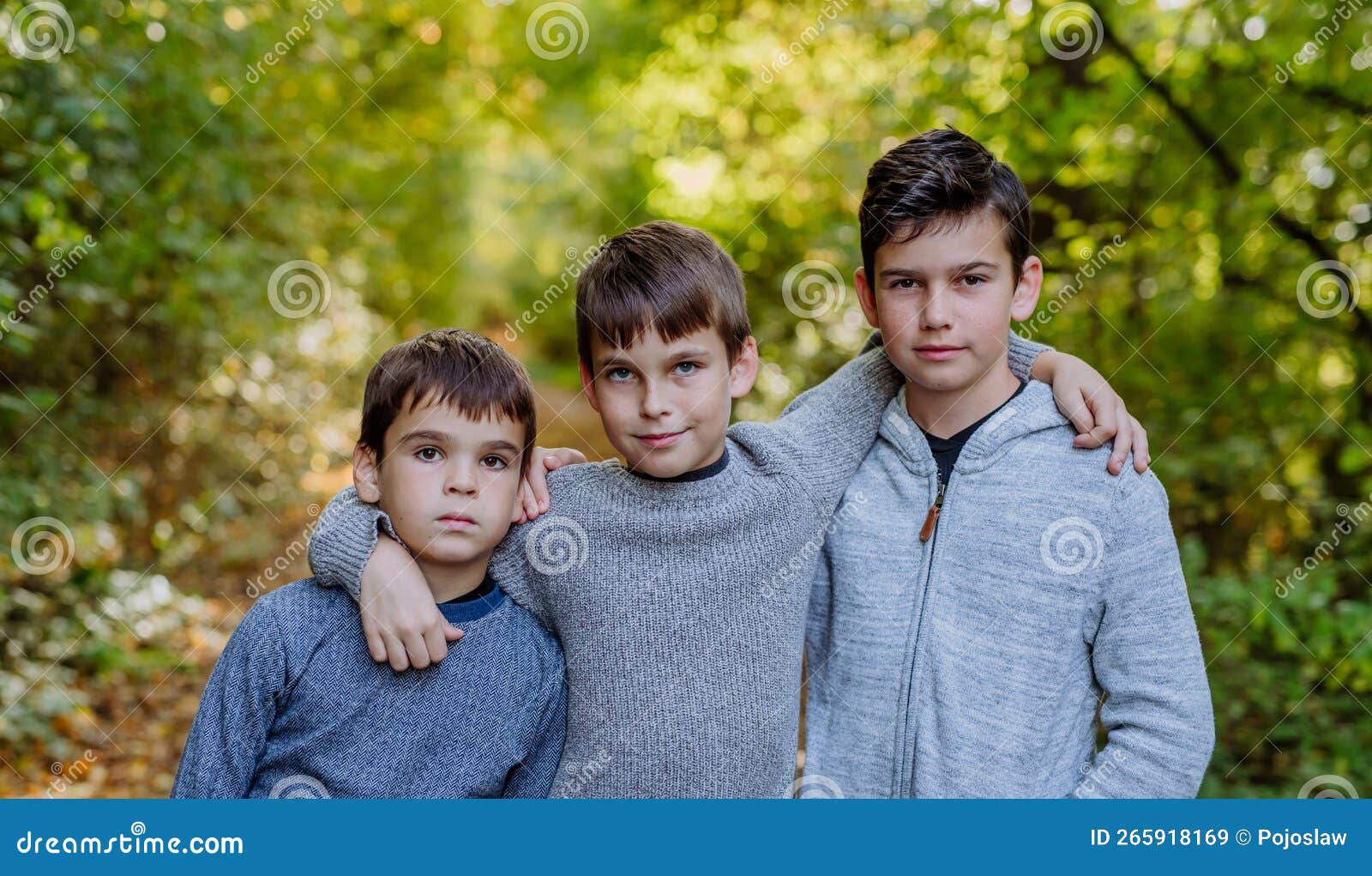 Portrait of Three Boys, Brothers Standing in Forest. Stock Image ...