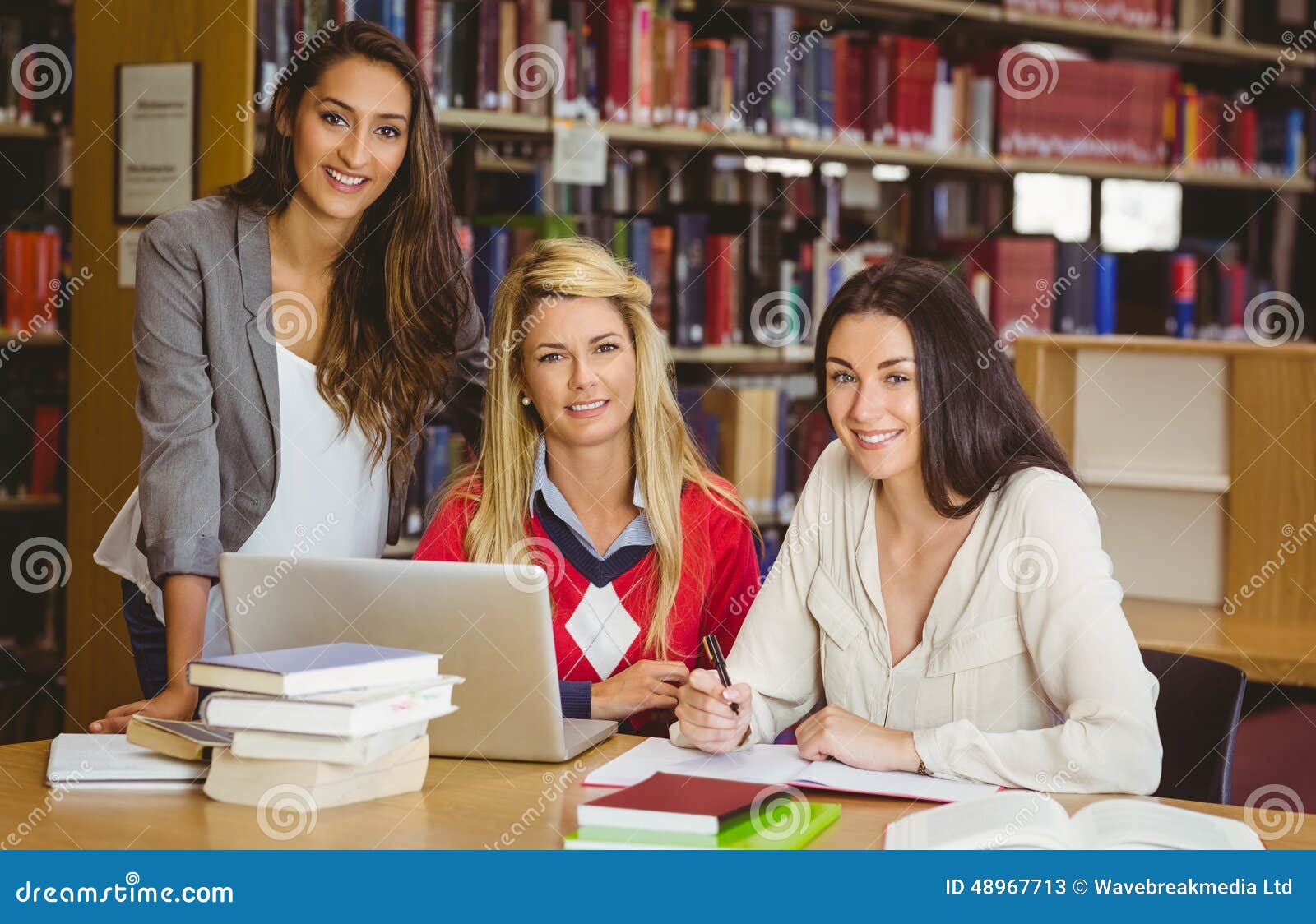 Portrait of Three Classmates Working Together Stock Image - Image of ...