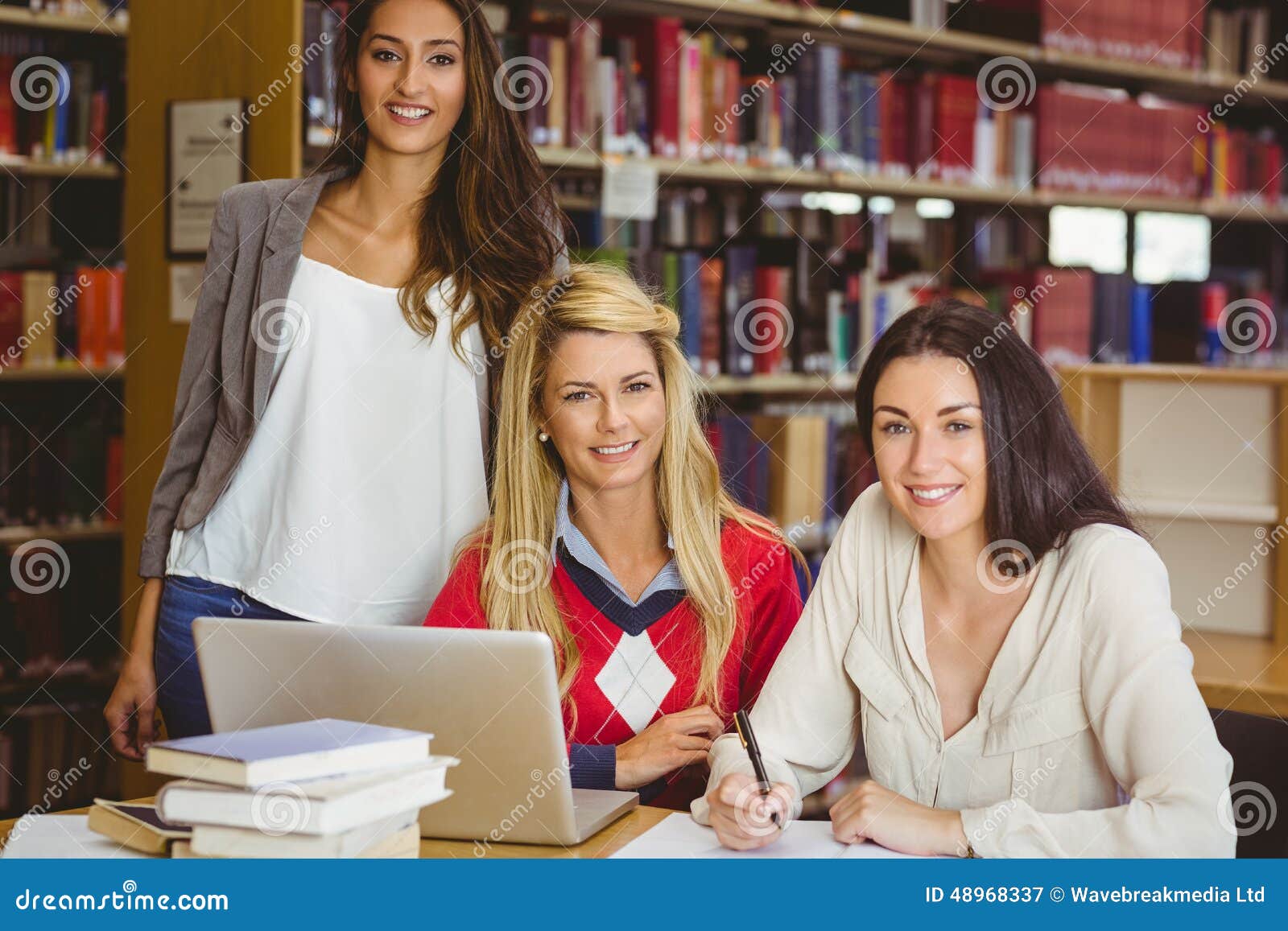 Portrait of Three Classmates Working Together Stock Image - Image of ...