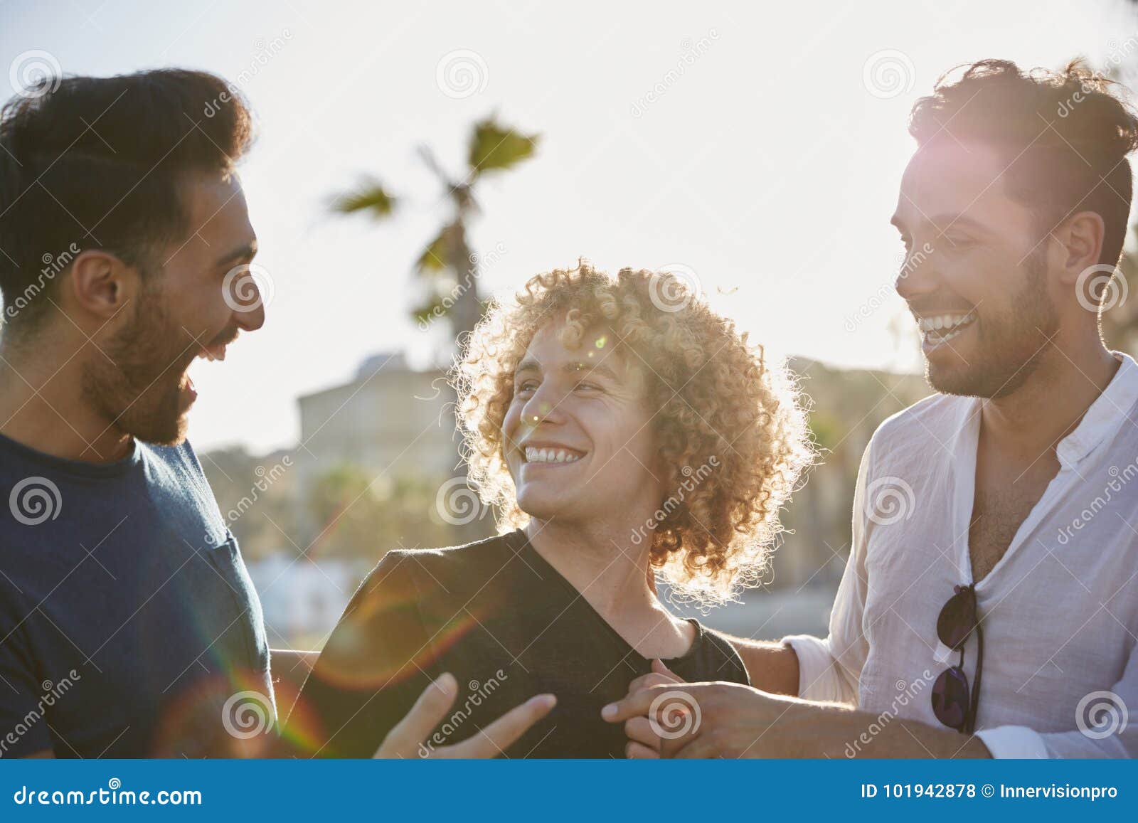 Three Happy Men Standing Together Outside Laughing Stock Photo - Image ...