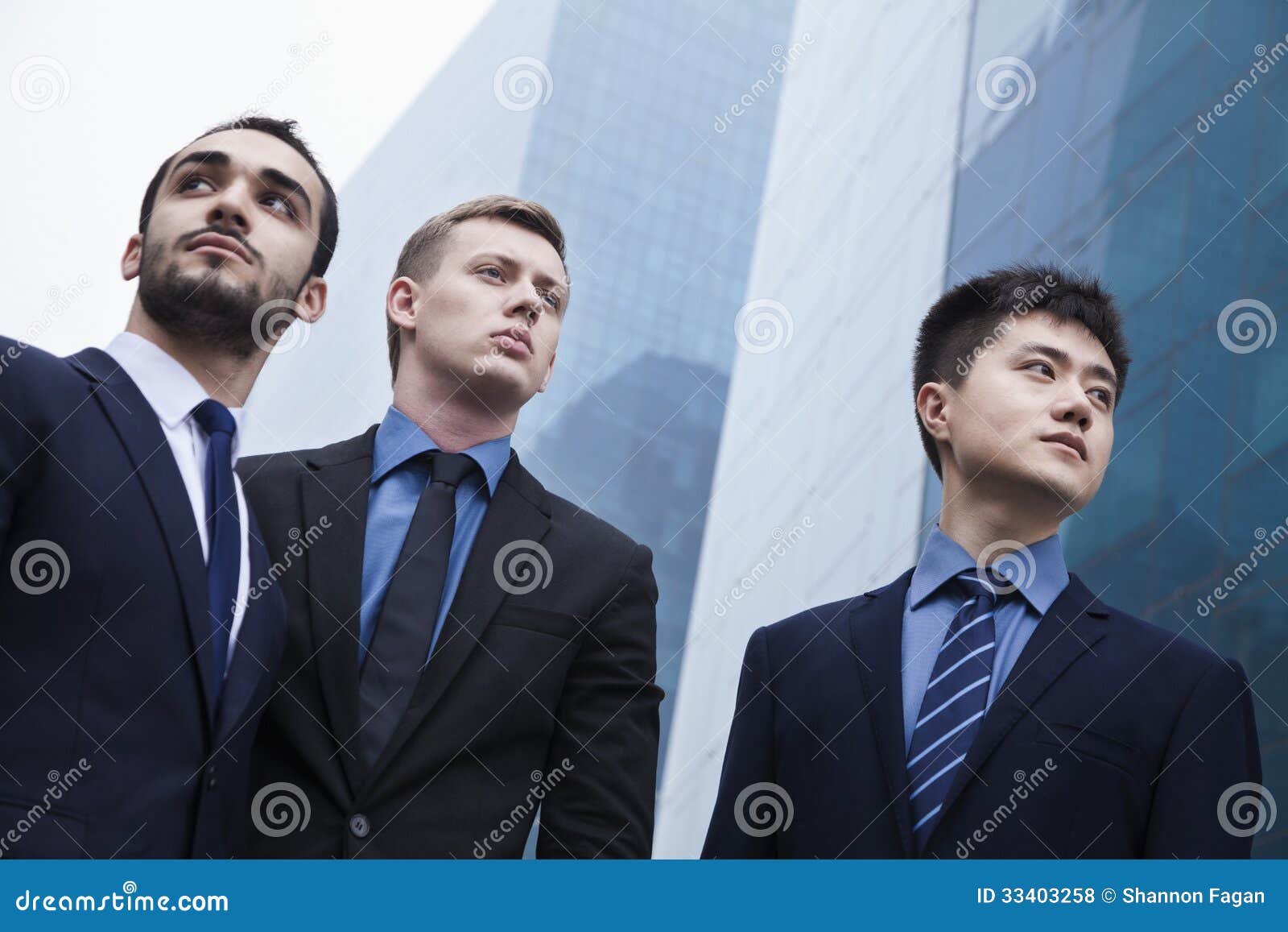 Portrait of Three Serious Businessmen, Outdoors, Business District ...