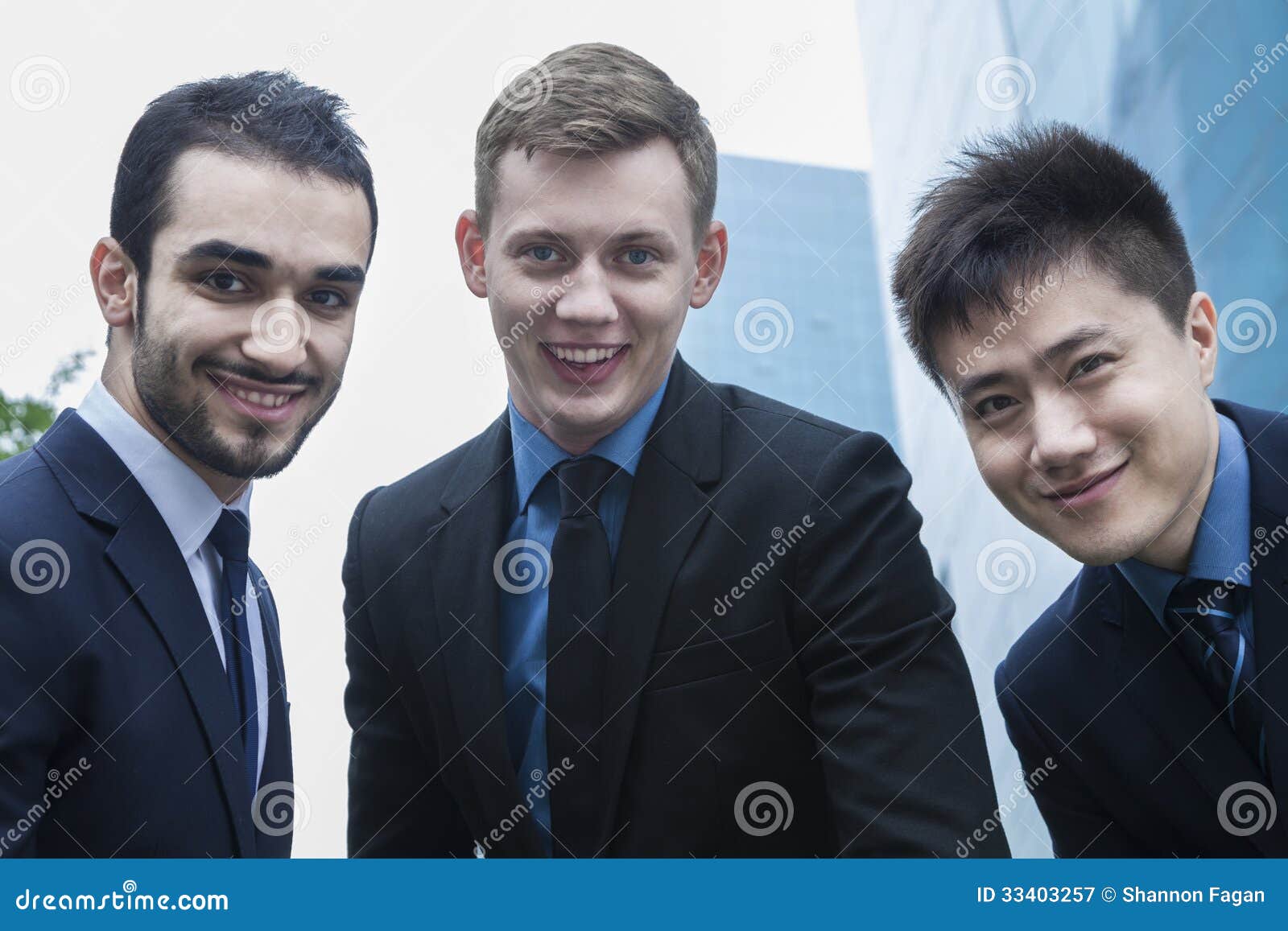 Portrait of Three Smiling Businessmen, Outdoors, Business District ...
