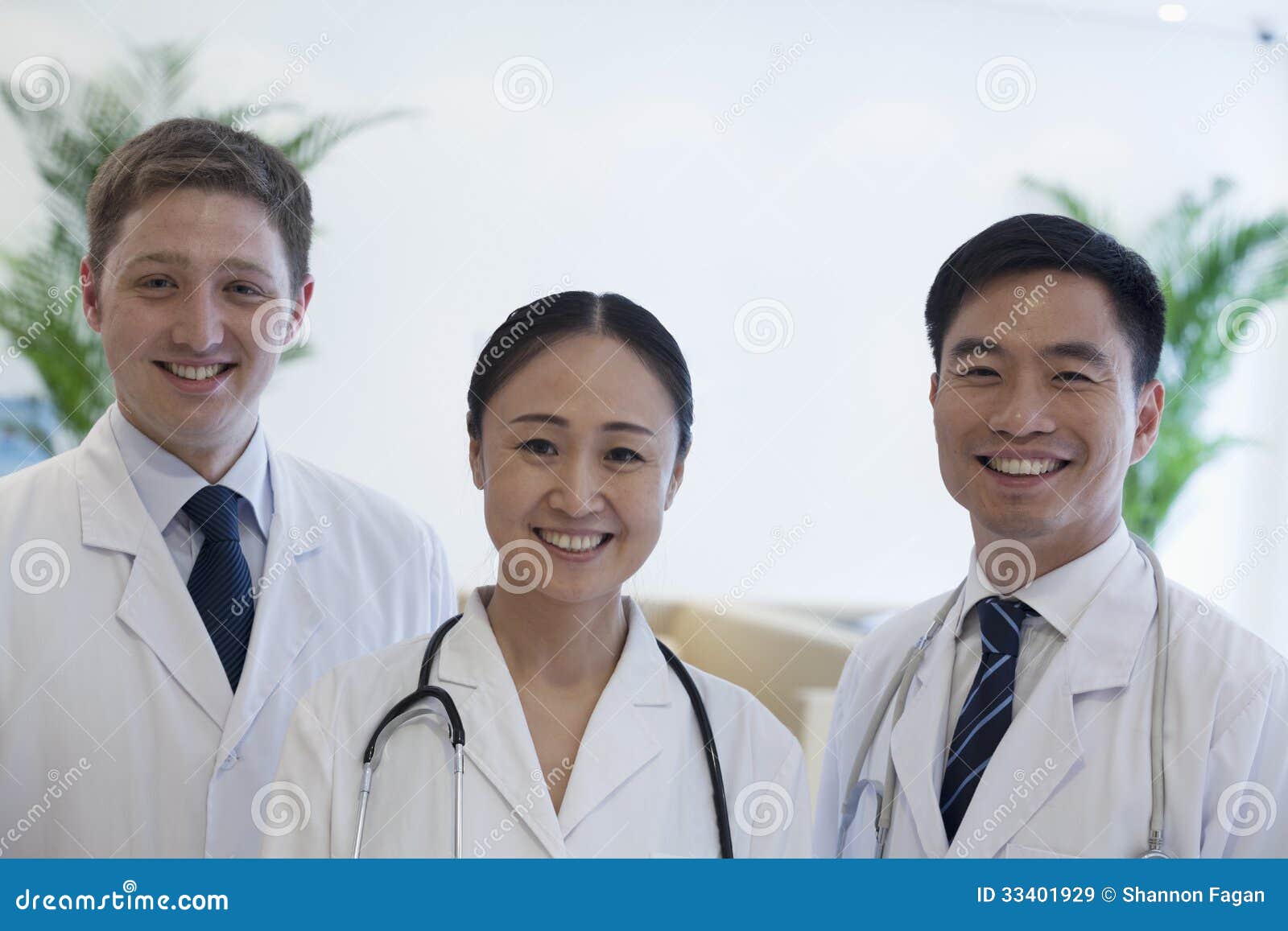 Portrait of Three Smiling Doctors in the Hospital, Multi-ethnic Group ...