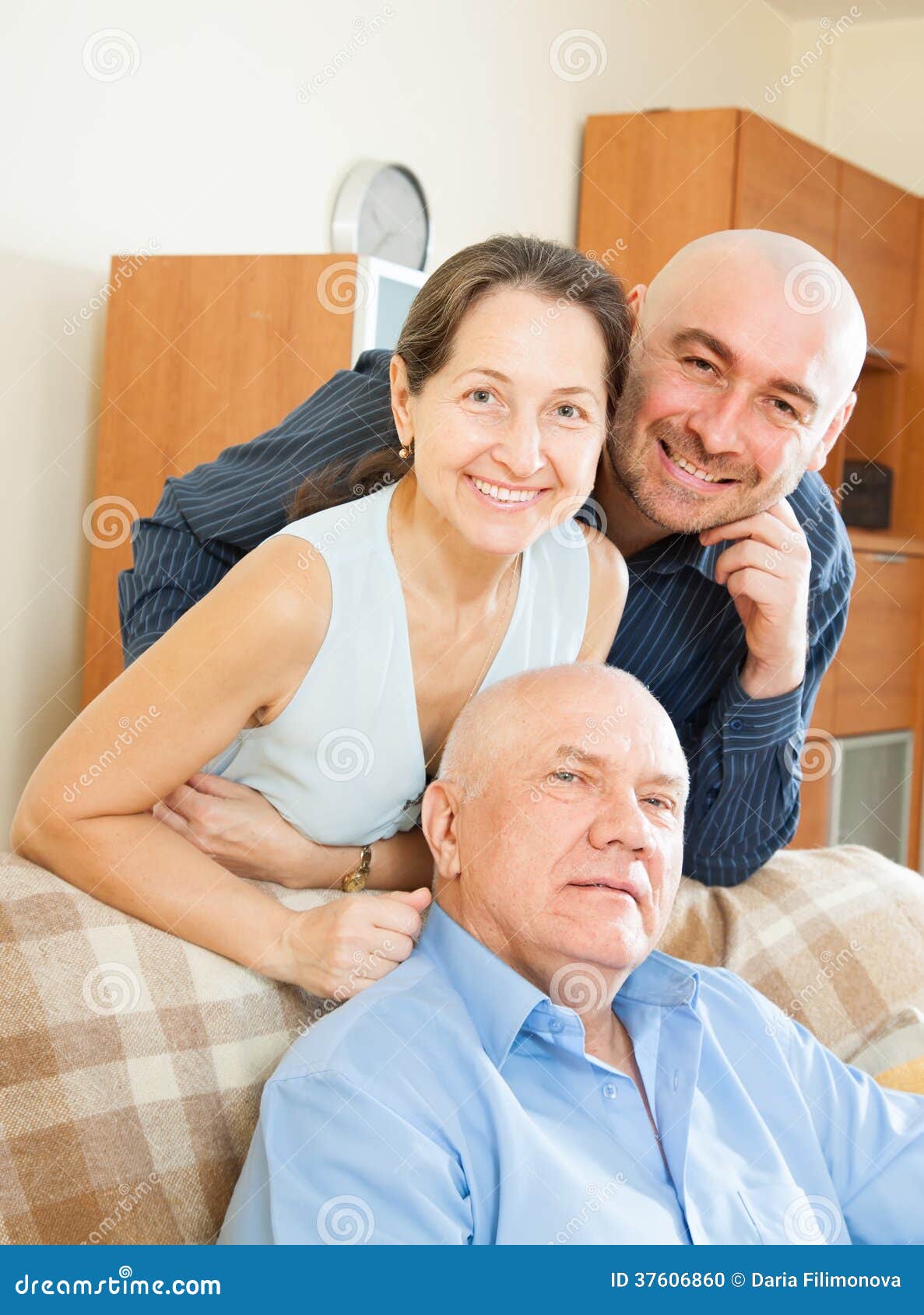 Portrait of Three Smiling People Stock Photo - Image of woman, indoors ...