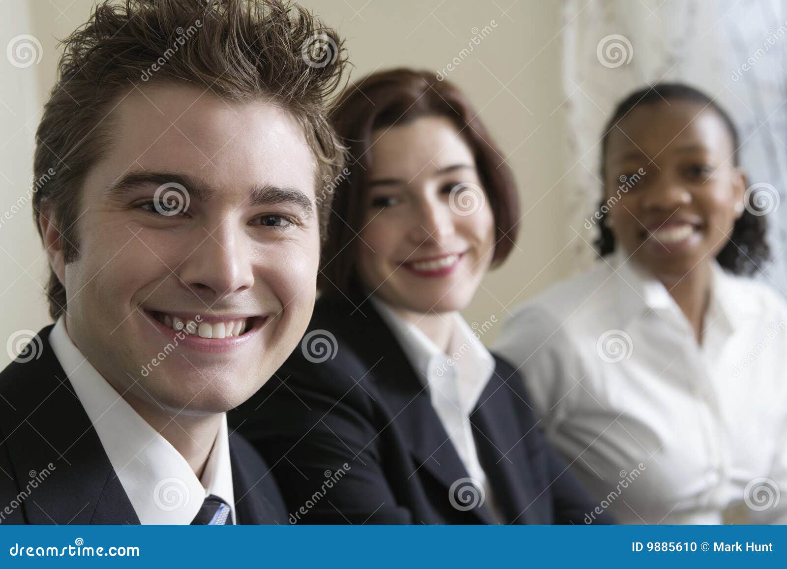 Portrait of Three Smiling Young Professionals. Stock Photo - Image of ...