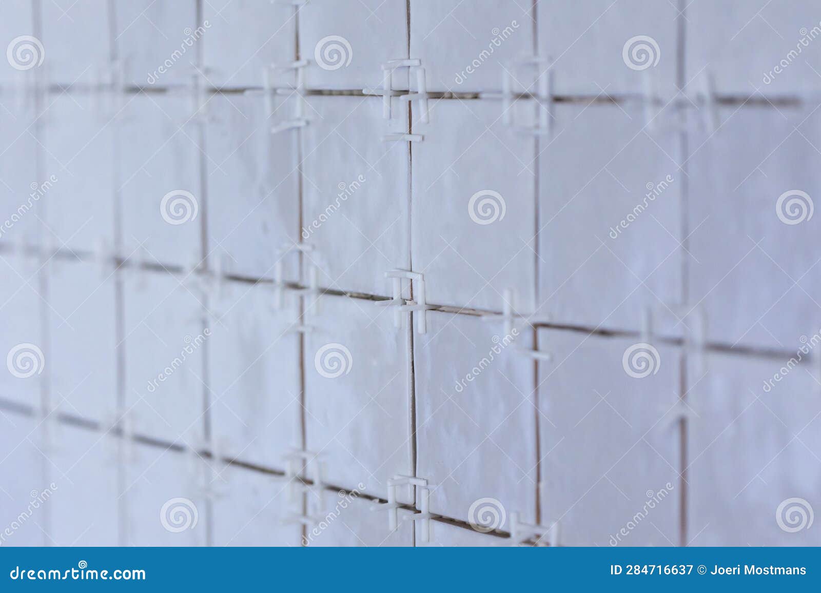 A Portrait of a Tile Wall Under Construction. the Wall is Being Tiled ...