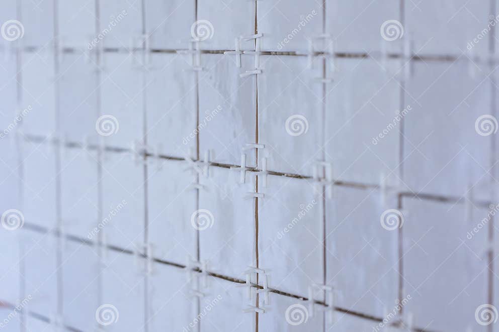 A Portrait of a Tile Wall Under Construction. the Wall is Being Tiled ...