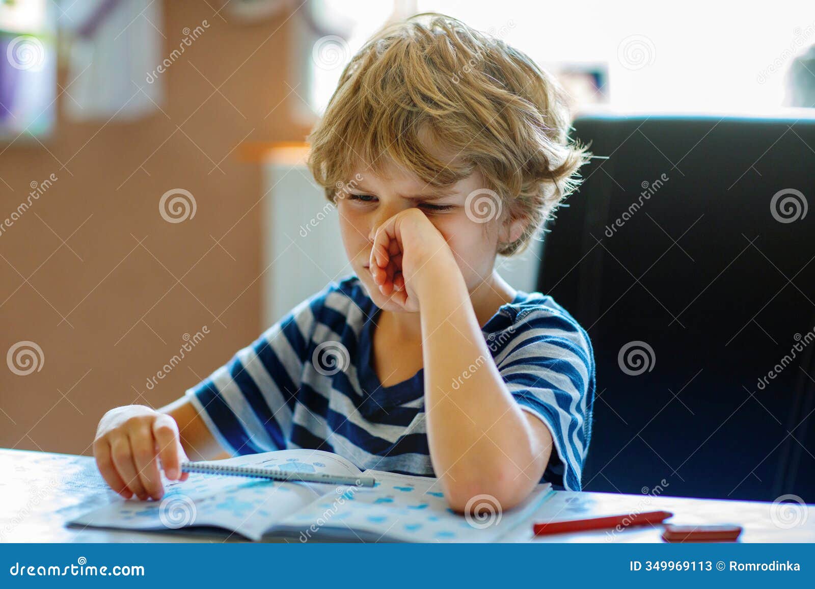 Portrait of Tired Upset Boy Doing Homework in Kitchen at Home ...