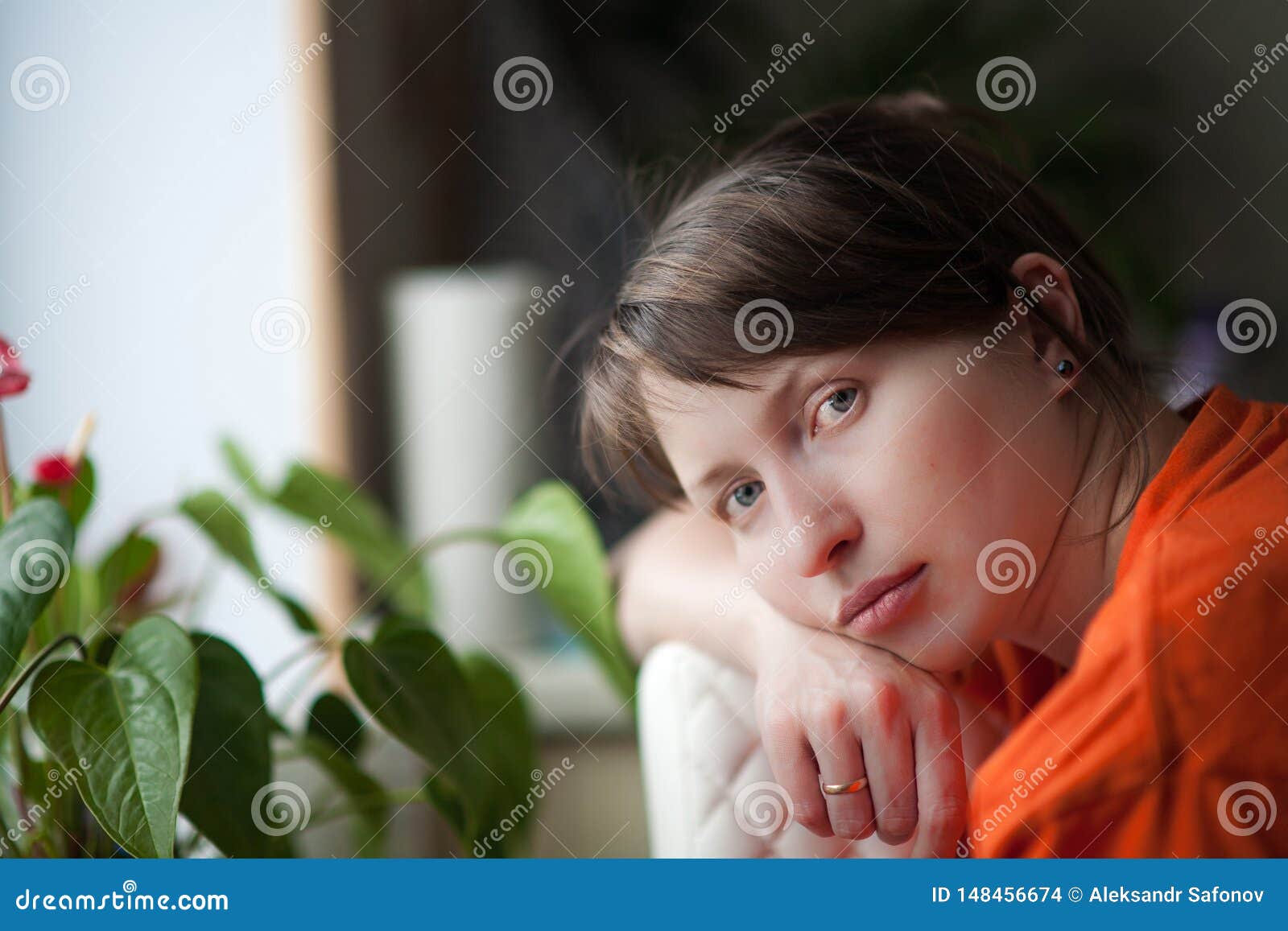 Portrait of a Tired Woman at Home Stock Photo - Image of sitting ...