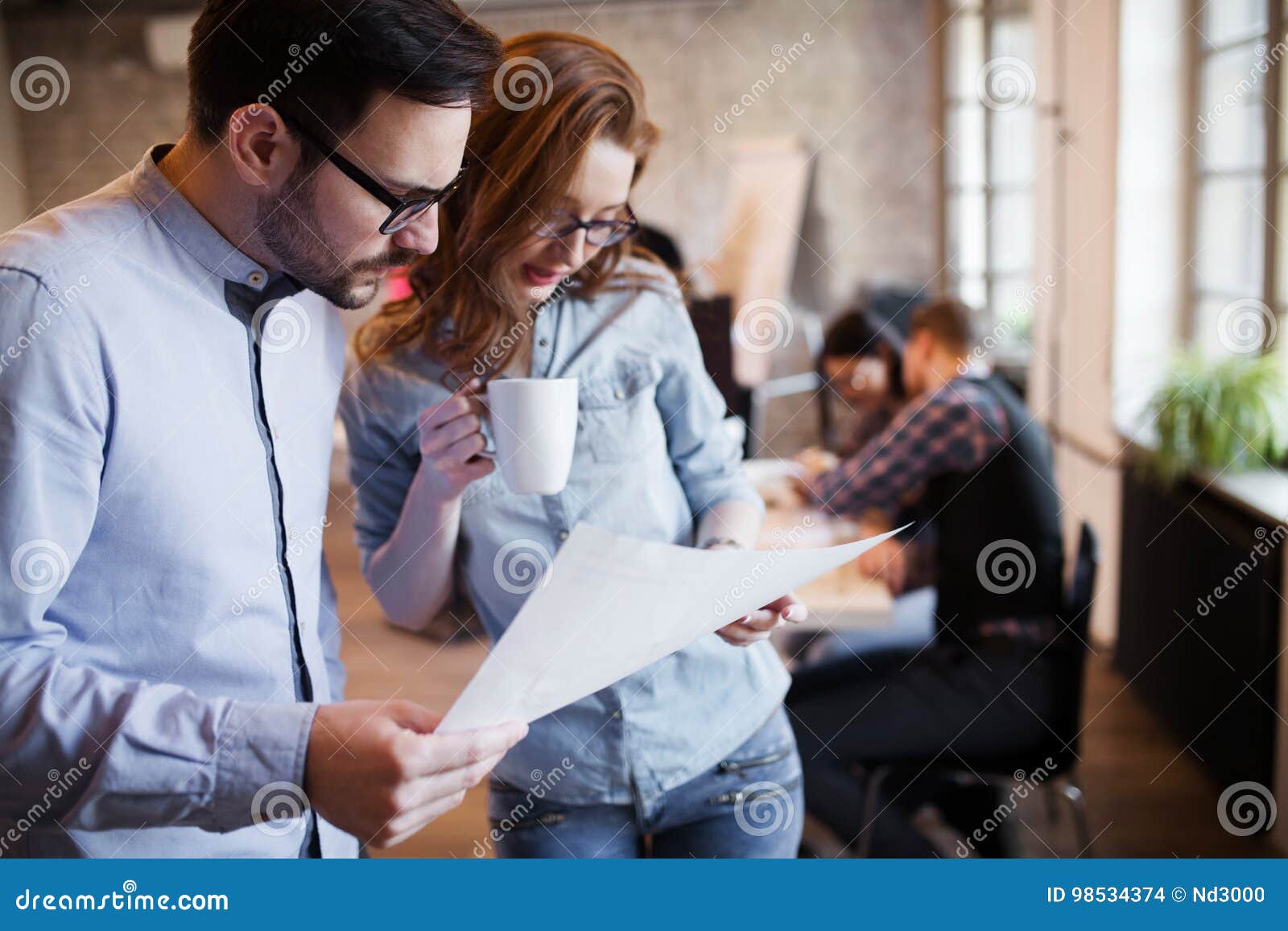 Portrait of Two Architects Looking at Project Scheme Stock Photo ...
