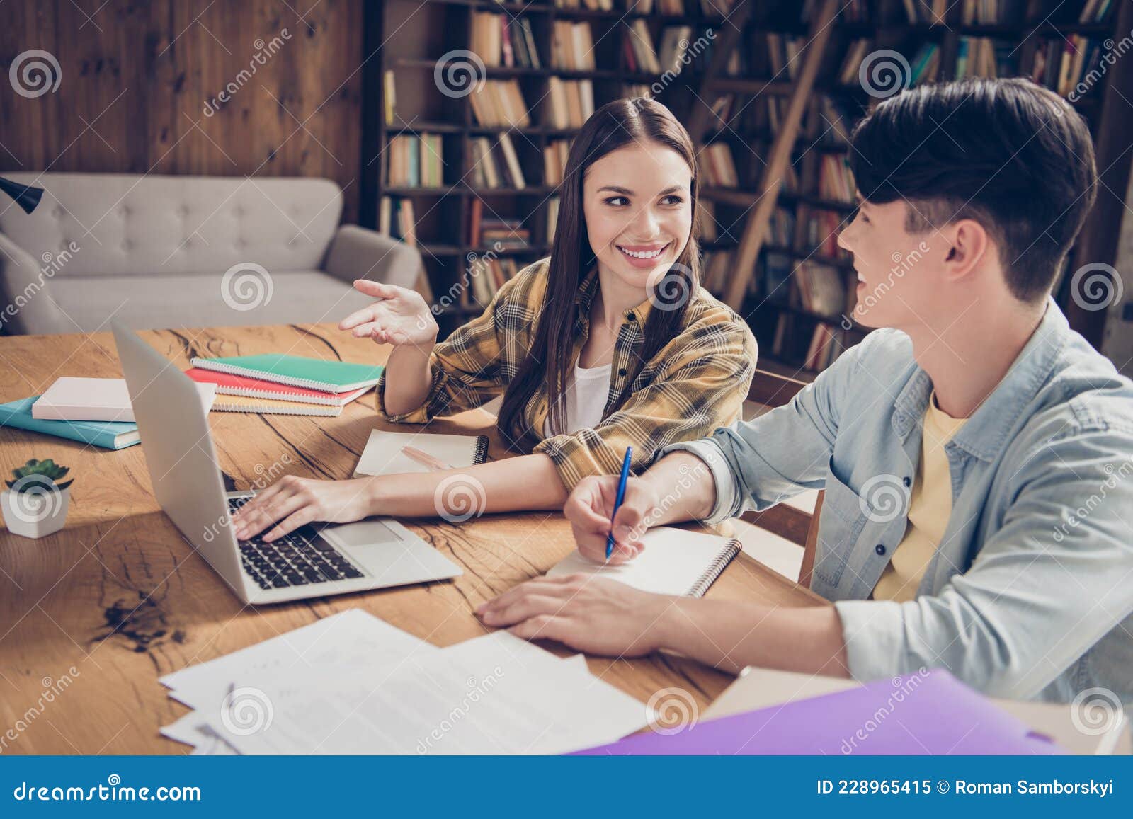 Portrait of Two Attractive Cheerful Classmates Learners Using Laptop ...