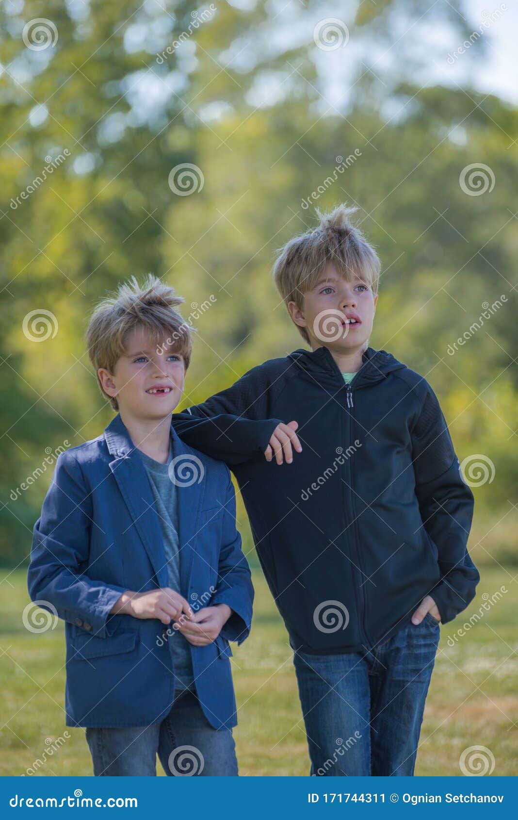 Portrait of Two Boys with a Blurred Background Stock Image - Image of ...